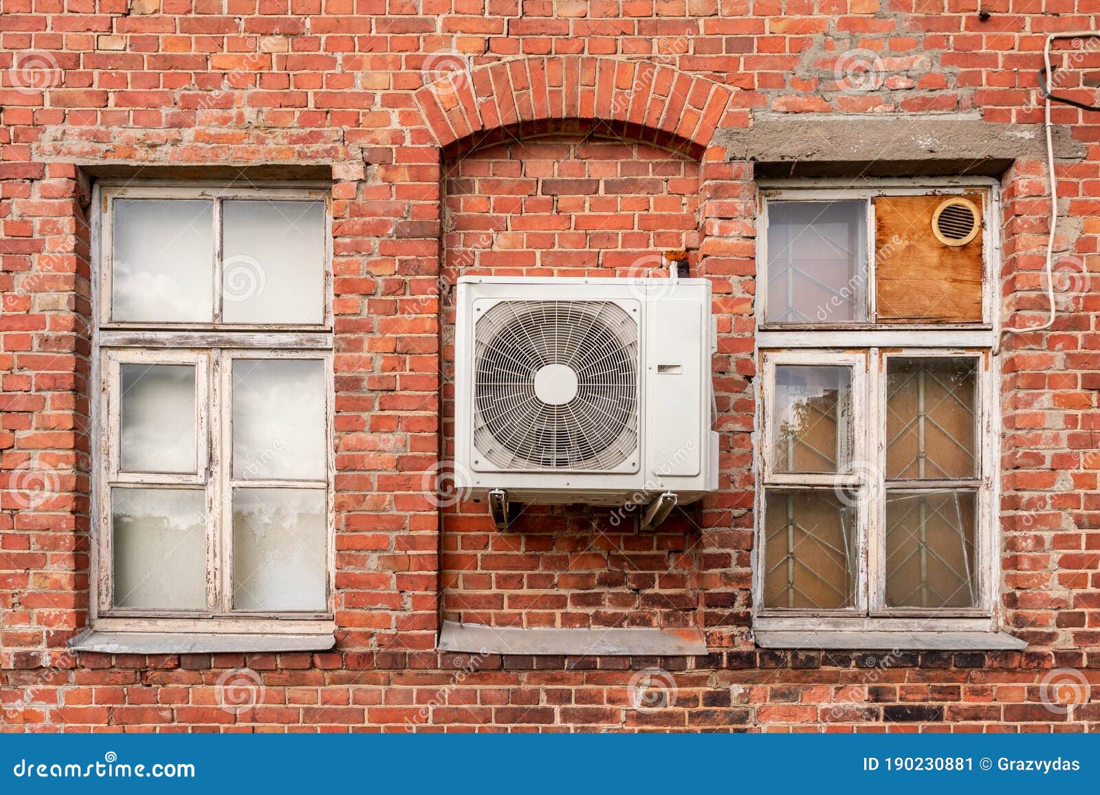 Air Conditioning Unit on the Facade of a Old Brick House Stock Image ...
