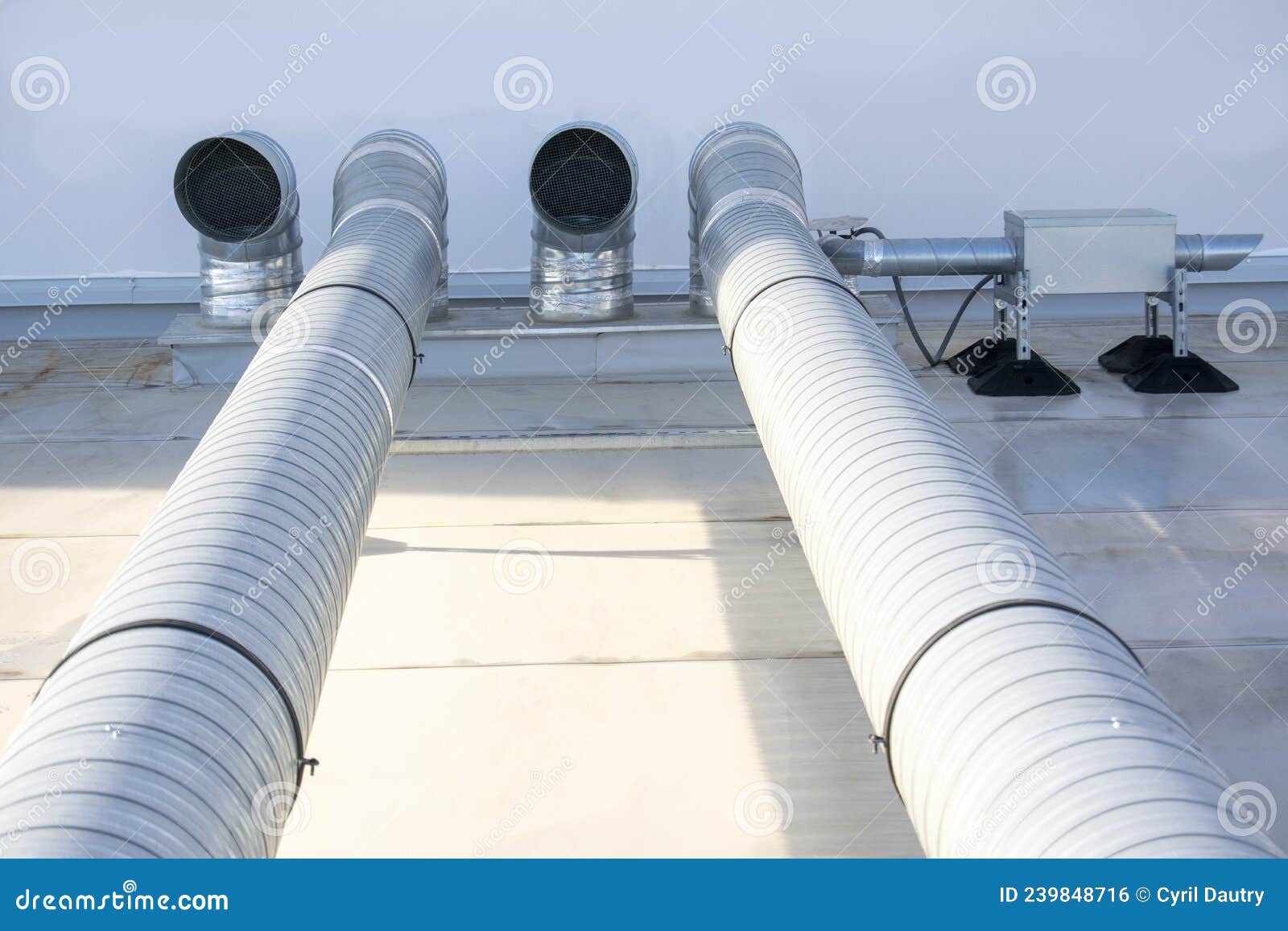 Air Extractor and Ducts on the Roof of a Warehouse Stock Photo - Image ...