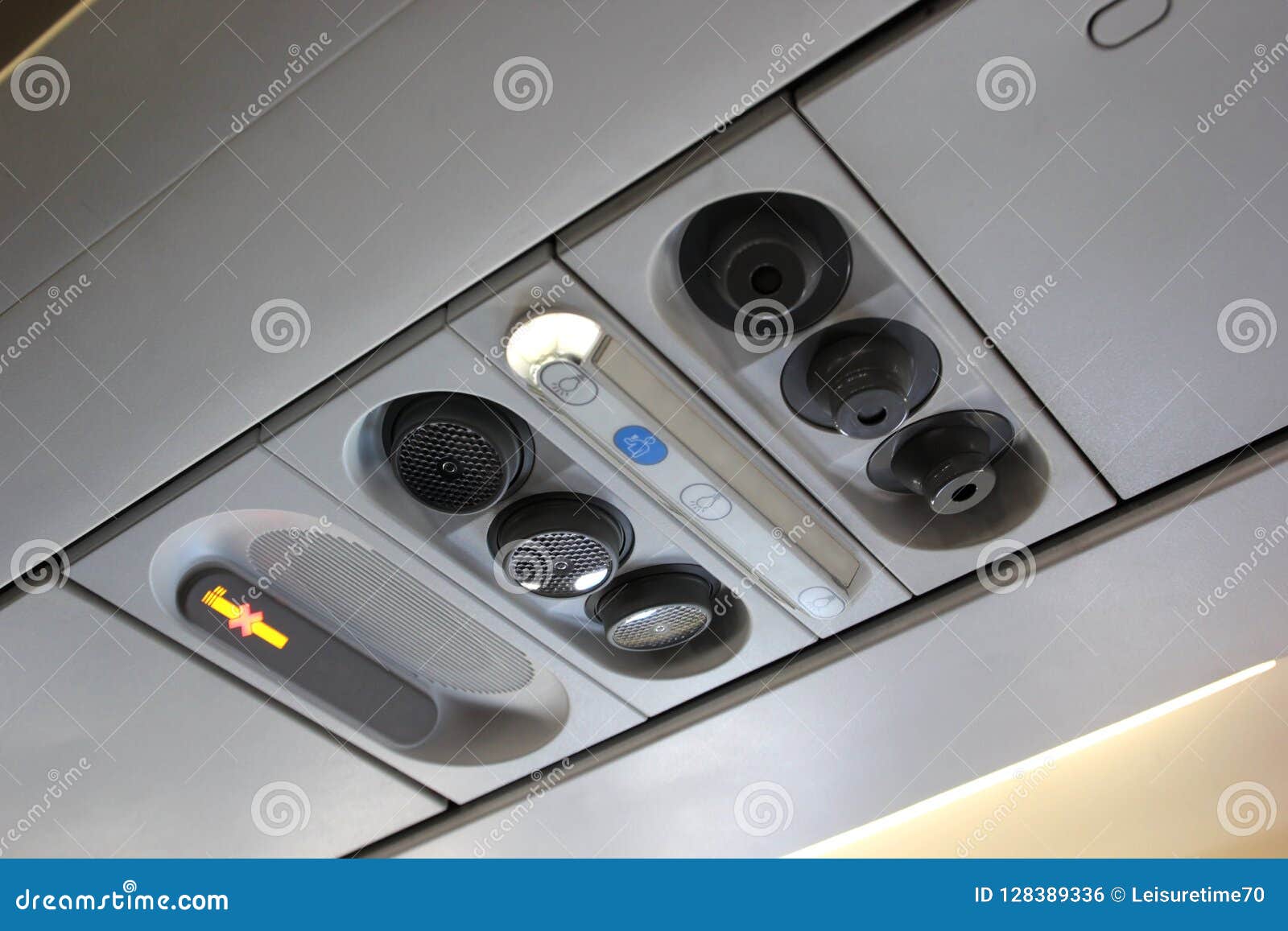 Air Grille Diffuser and Lamp on Ceiling in the Airplane Stock Photo ...
