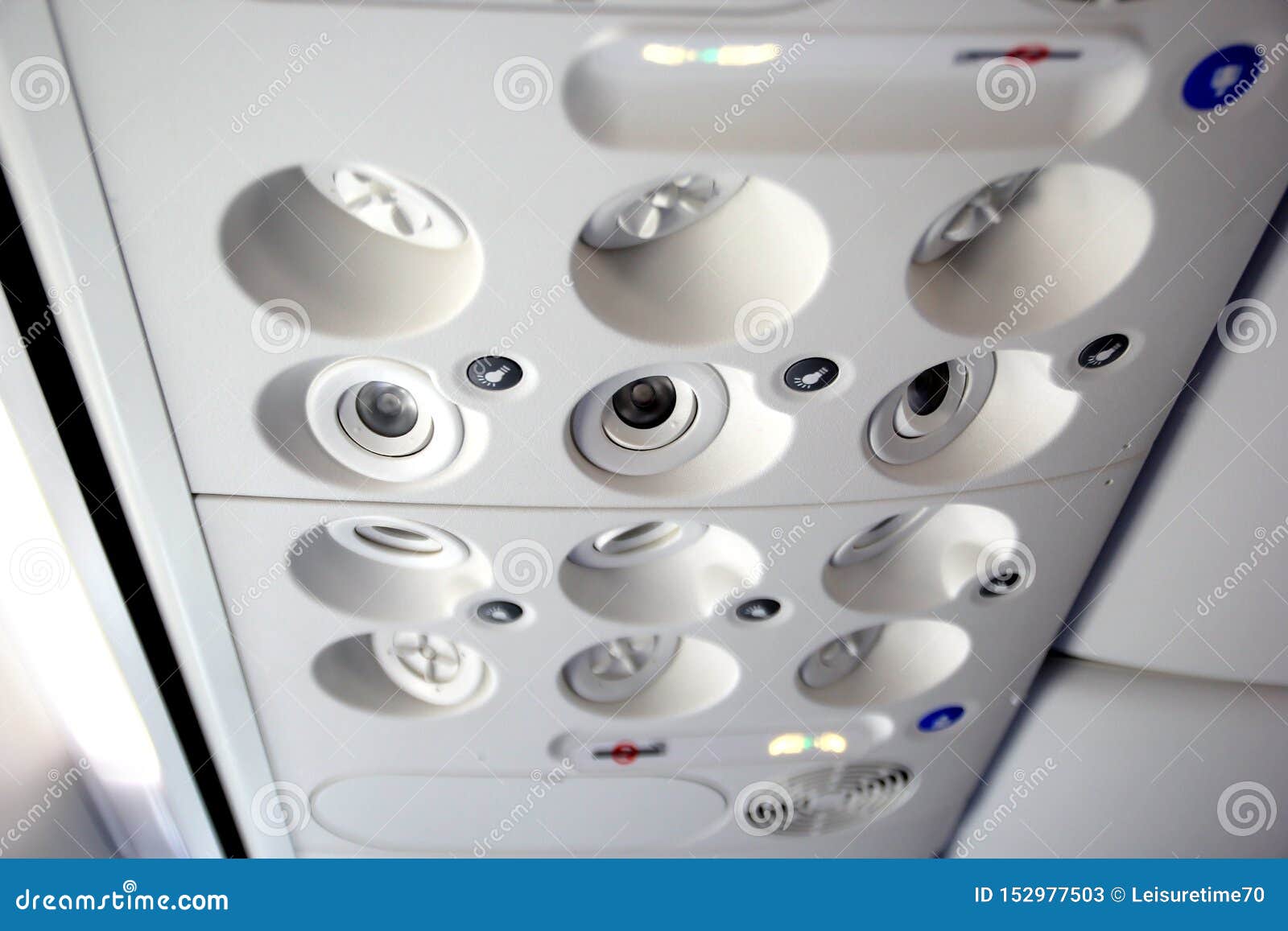 Air Grille Diffuser and Lamp on Ceiling in the Airplane Stock Image ...