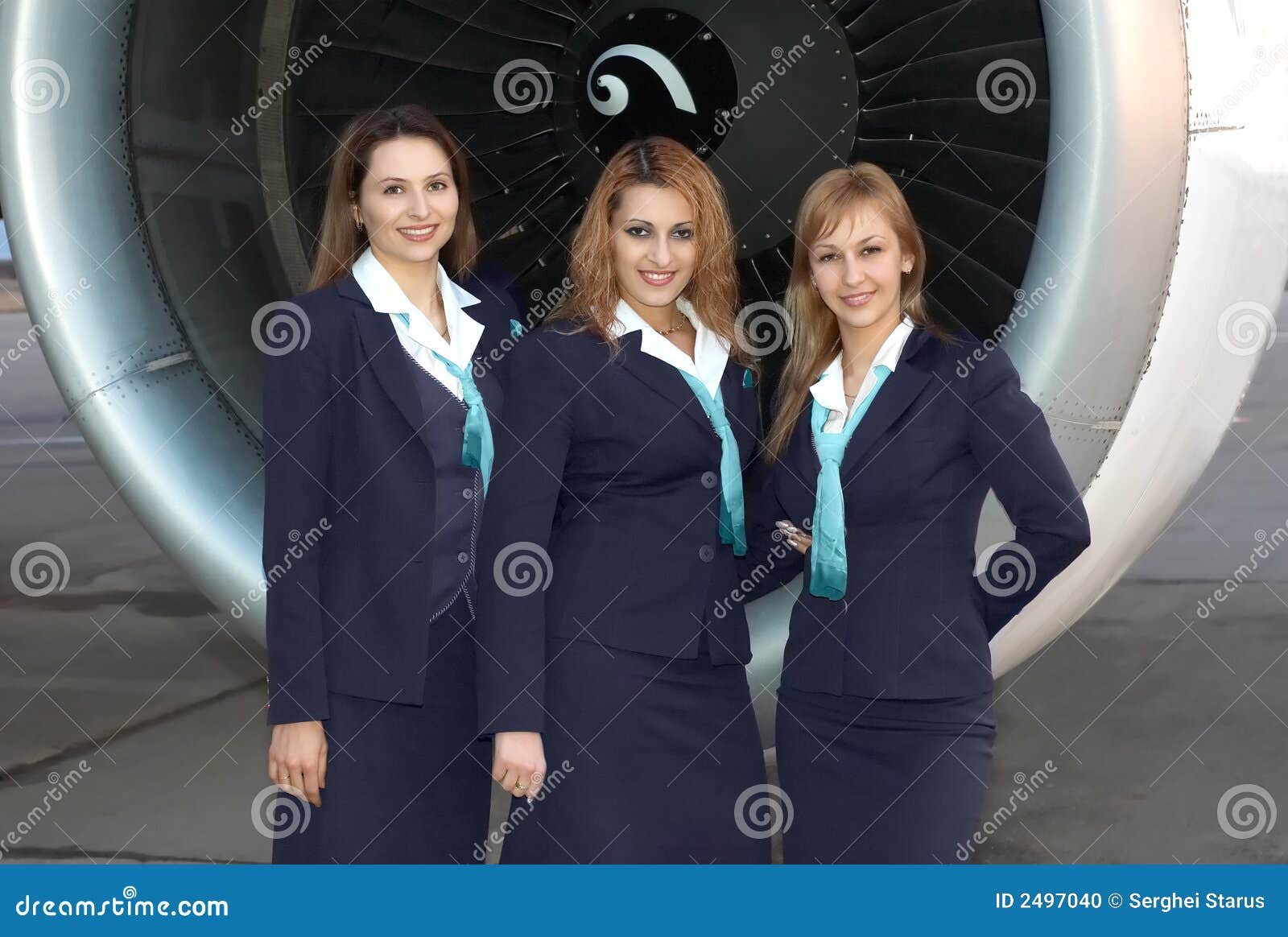 Air Hostesses in Front of Engine Stock Photo - Image of looking ...
