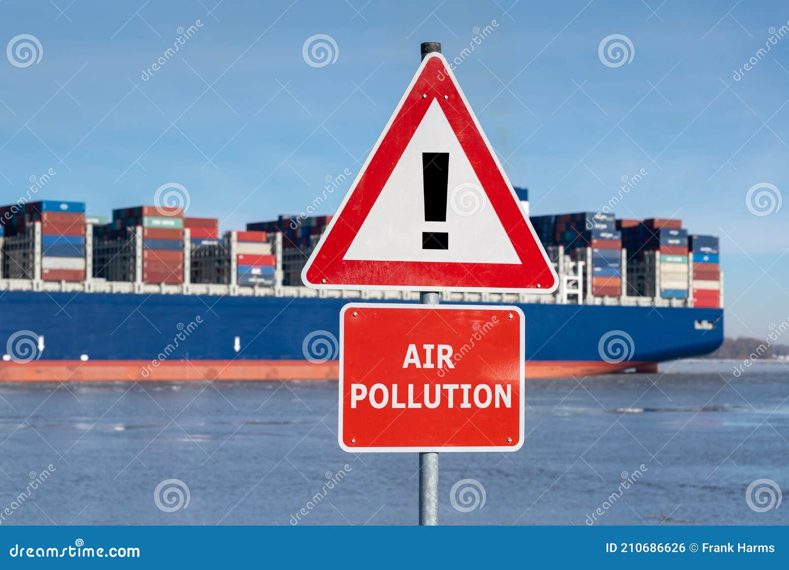 Air Pollution Warning Sign in Front of a Huge Container Ship Stock ...