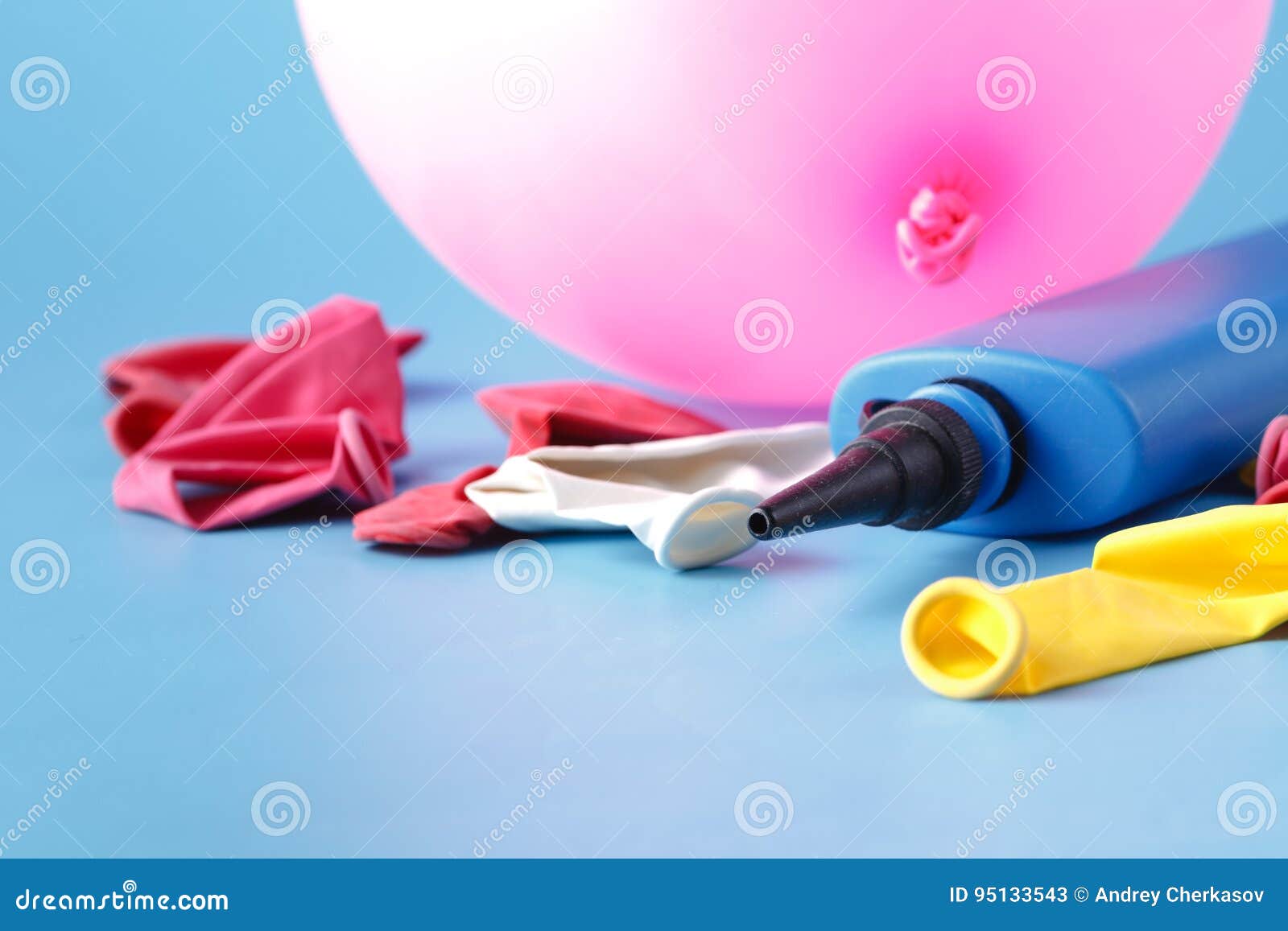 Air-pump Inflating a Pink Ballon on a Blue Background Stock Image ...