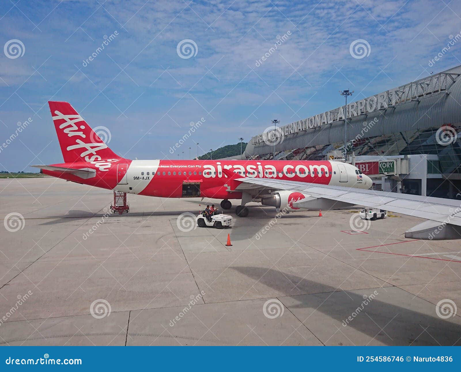 Airasia Planes Park At A Terminal At Jakarta Airport, Seen From A ... Airasia Planes Park At A Terminal At Jakarta Airport, Seen From A ...