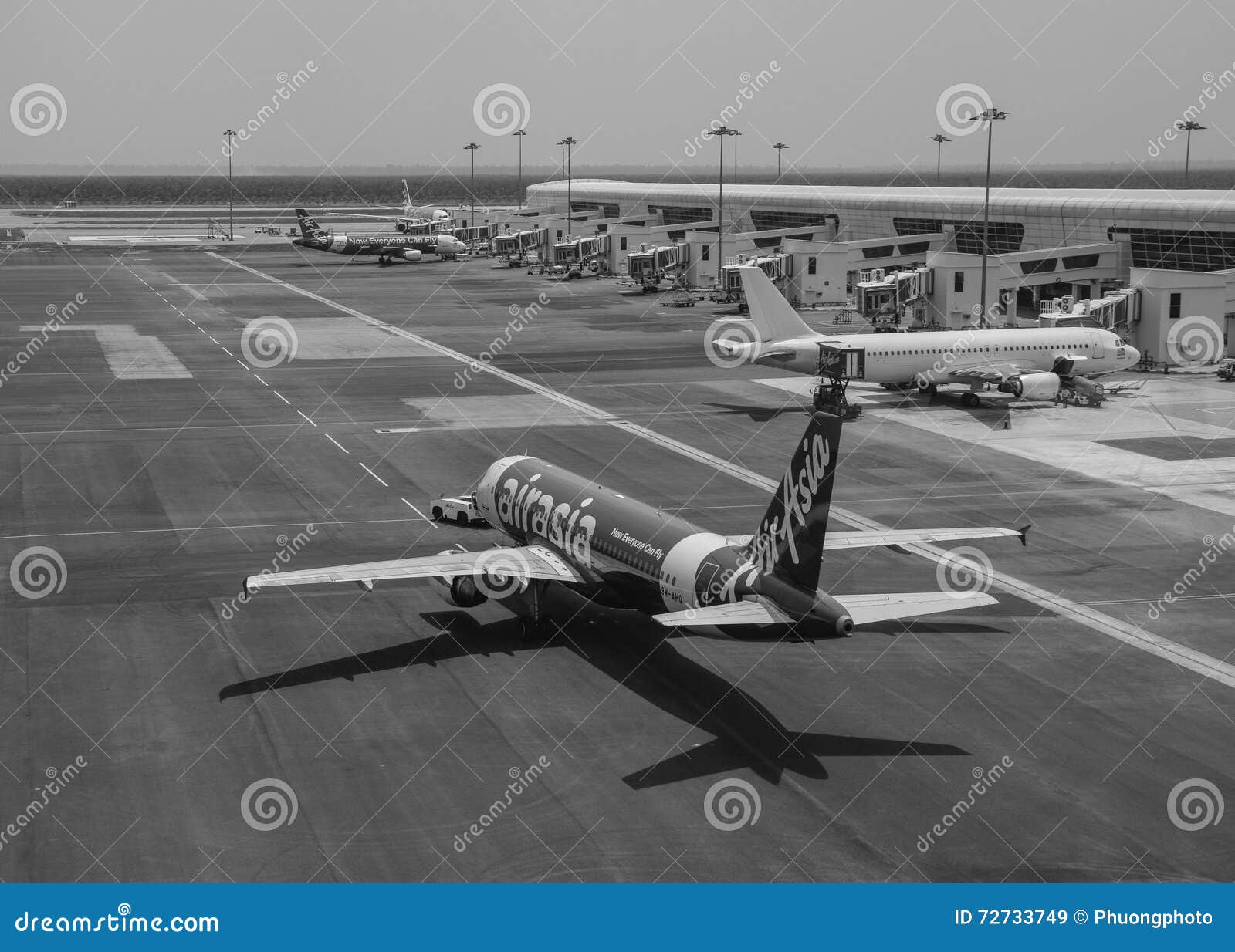 Airasia Planes Park At A Terminal At Jakarta Airport, Seen From A ... Airasia Planes Park At A Terminal At Jakarta Airport, Seen From A ...