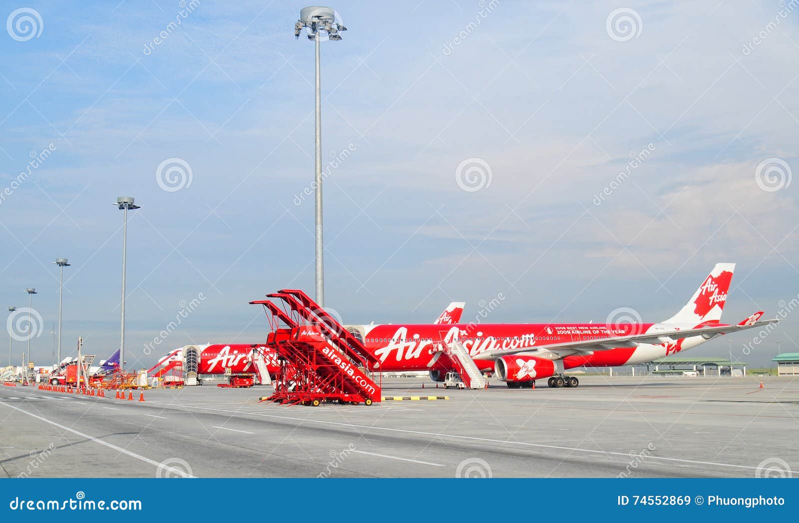 Airasia Planes Park At A Terminal At Jakarta Airport, Seen From A ... Airasia Planes Park At A Terminal At Jakarta Airport, Seen From A ...