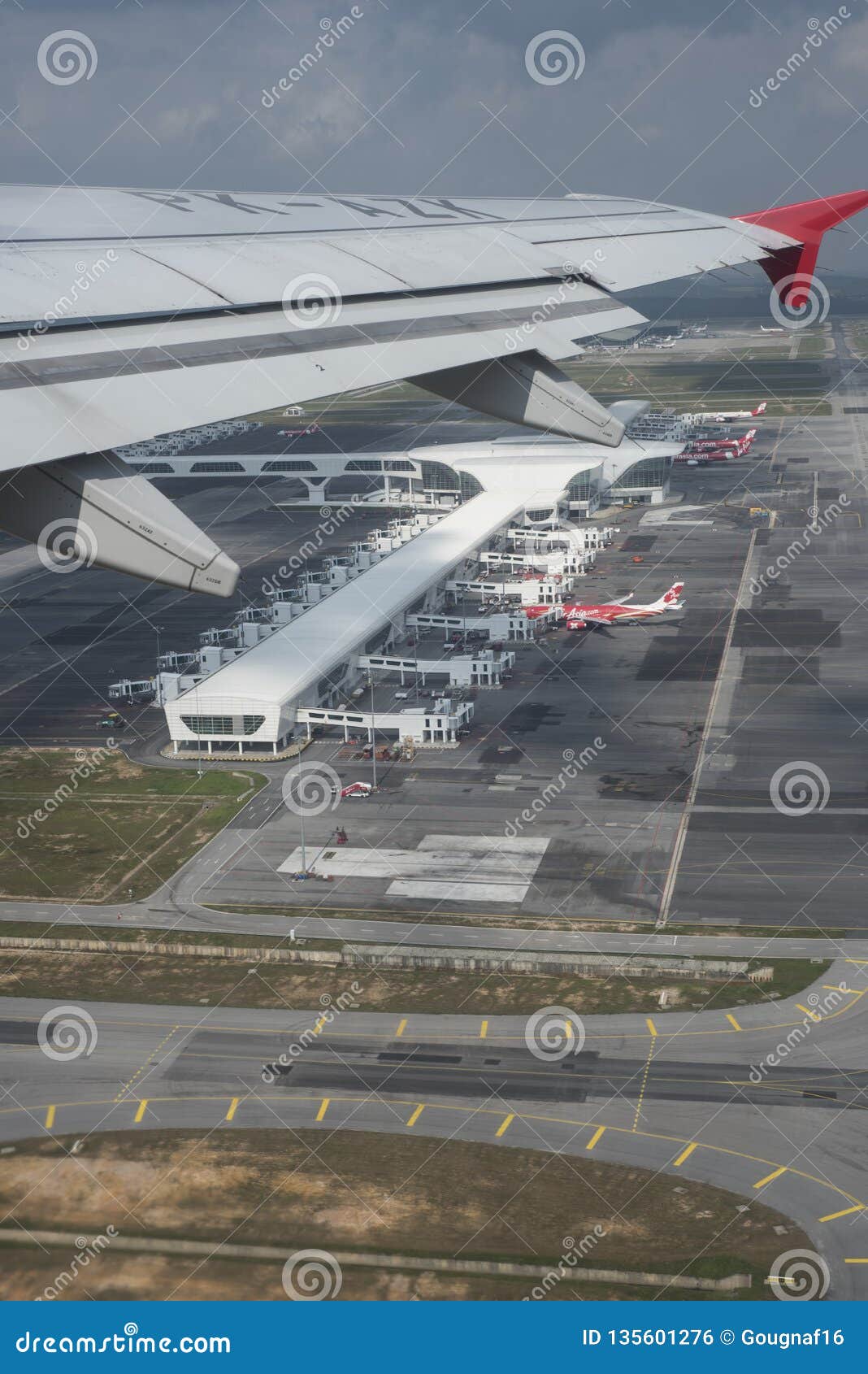 Airasia Planes Park At A Terminal At Jakarta Airport, Seen From A ... Airasia Planes Park At A Terminal At Jakarta Airport, Seen From A ...