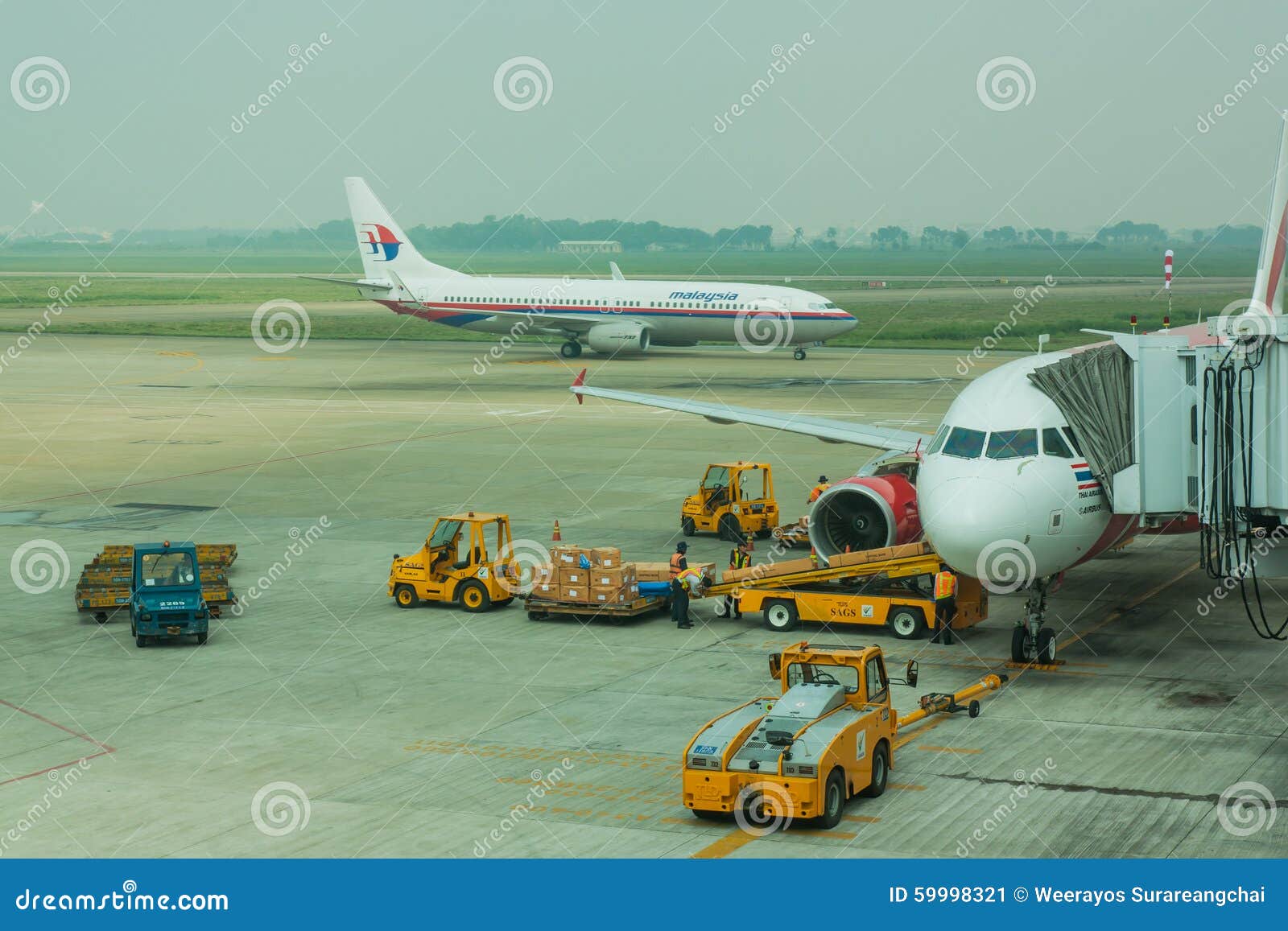 Airasia Planes Park At A Terminal At Jakarta Airport, Seen From A ... Airasia Planes Park At A Terminal At Jakarta Airport, Seen From A ...