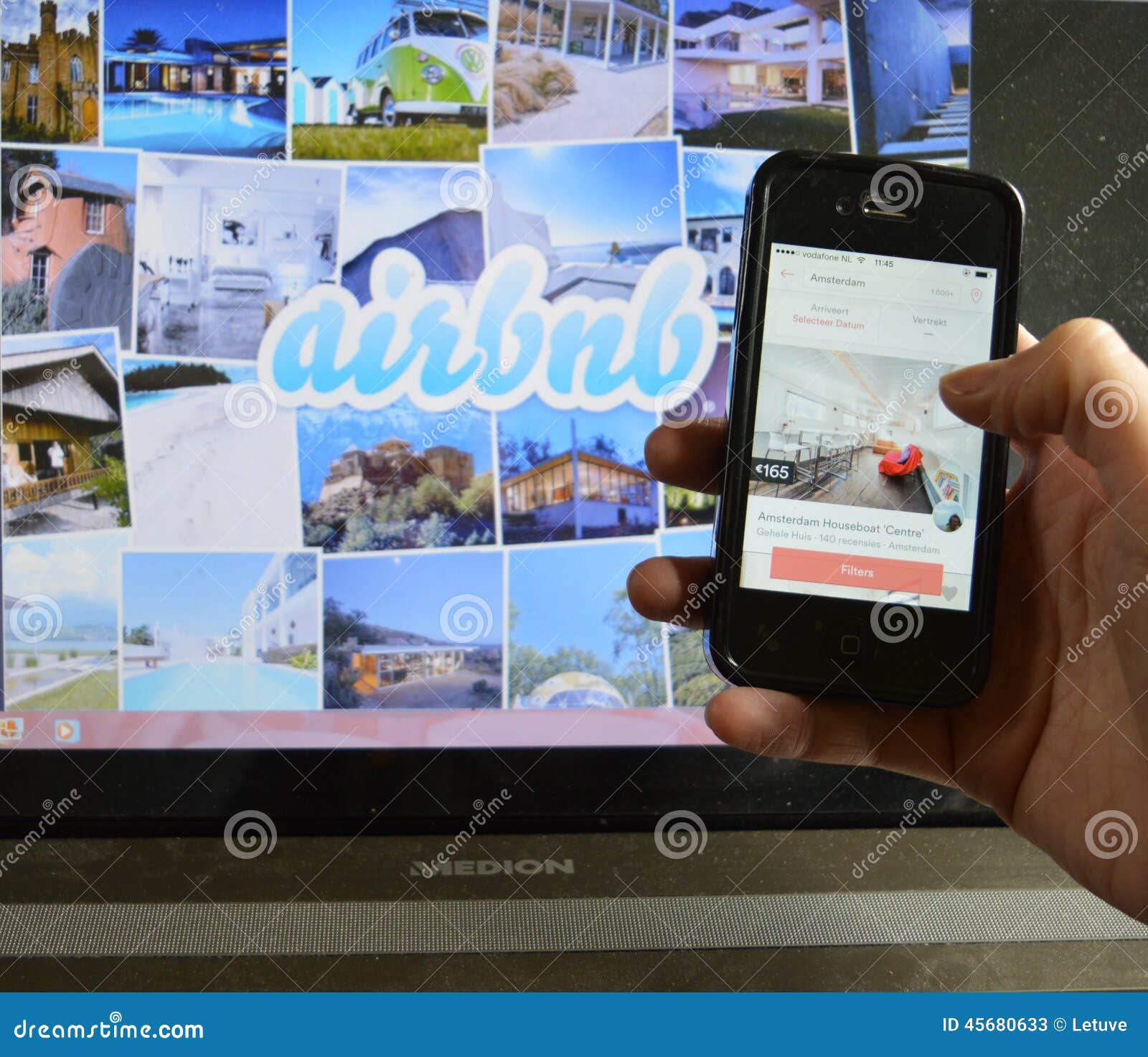 Airbnb app and laptop editorial stock photo. Image of mobile - 45680633