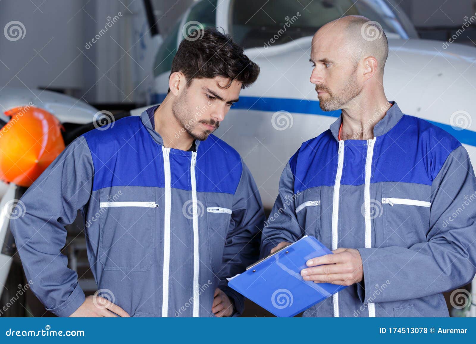 Aircraft Assembling Team Having Conversation Stock Photo - Image of ... Aircraft Assembling Team Having Conversation Stock Photo - Image of ...