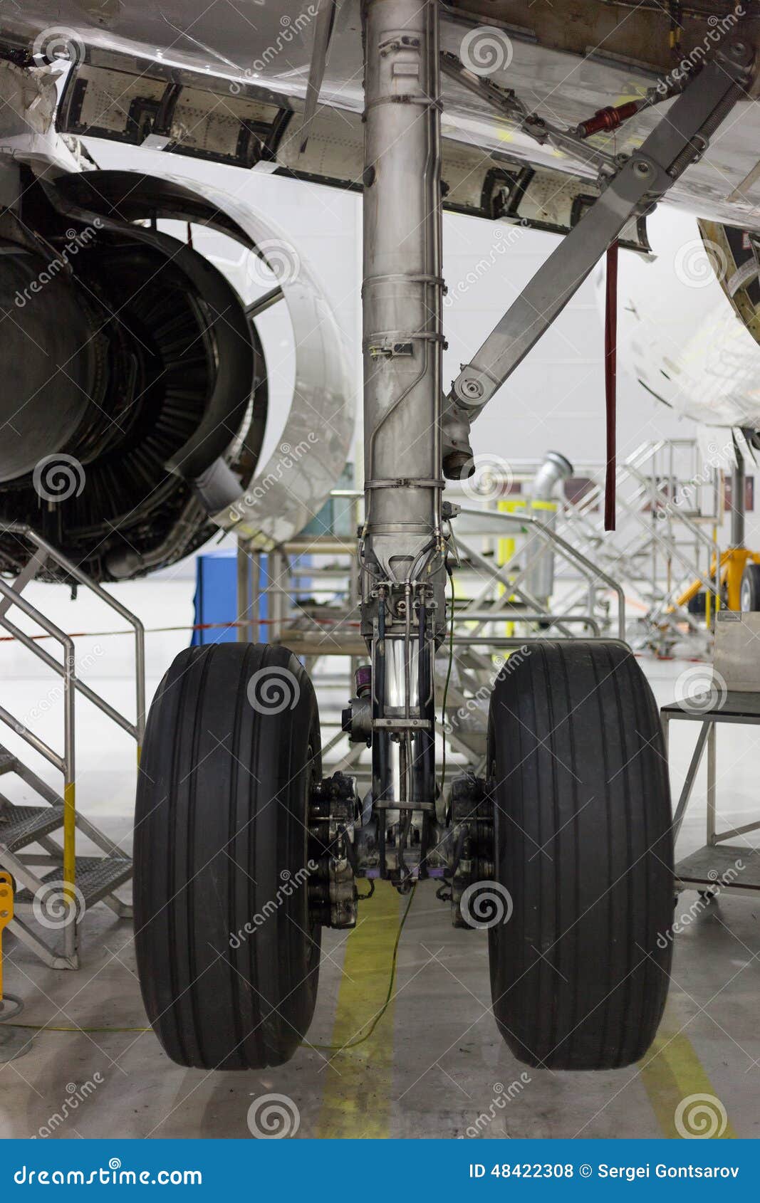 Aircraft Chassis. Hull, Chassis, Engines And Propellers Of An Old Plane ...
