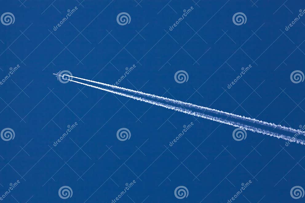 Aircraft and contrails stock image. Image of flying, stress - 19574157