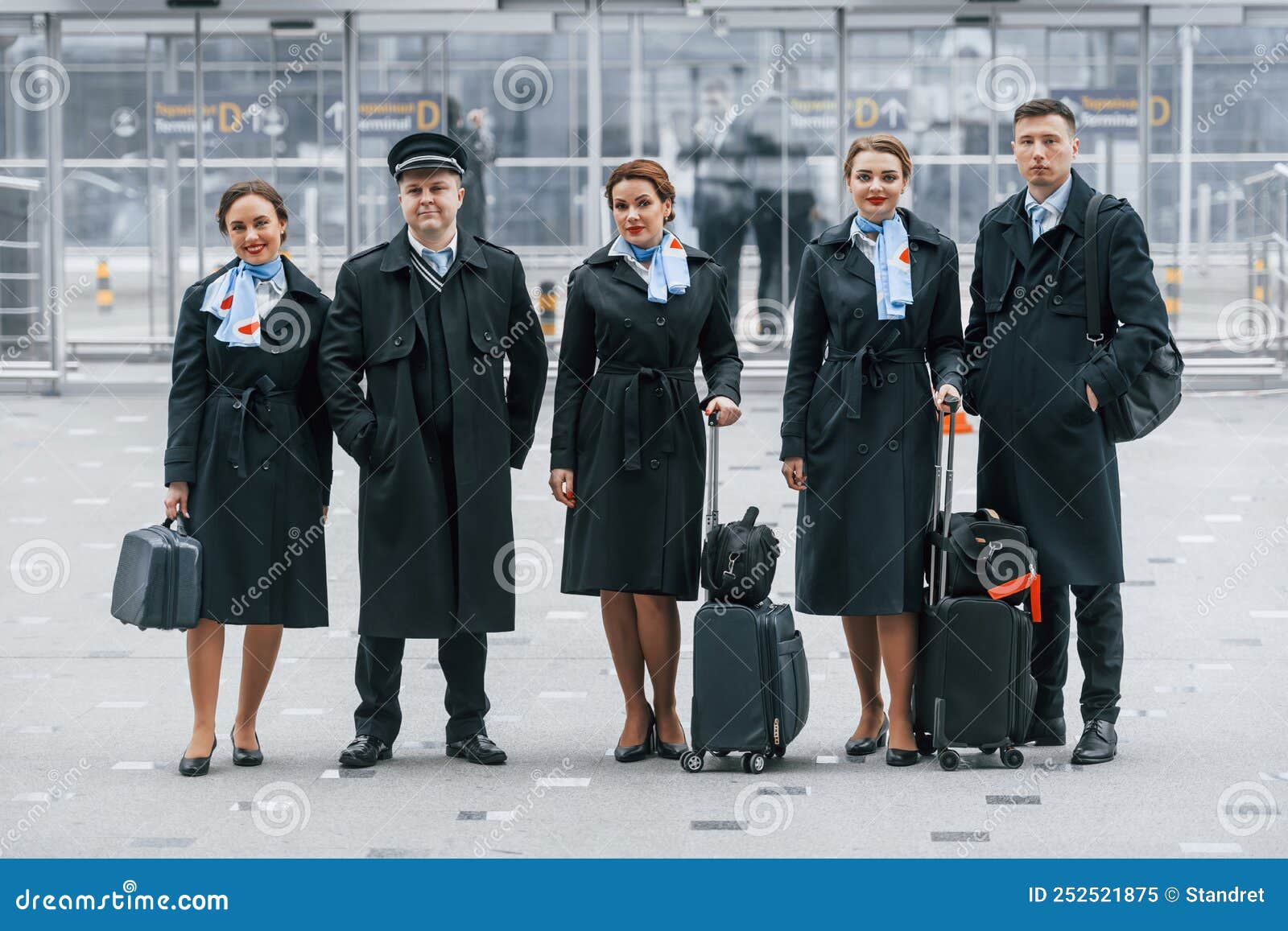 Aircraft Crew in Work Uniform is Together Outdoors in the Airport Stock ...