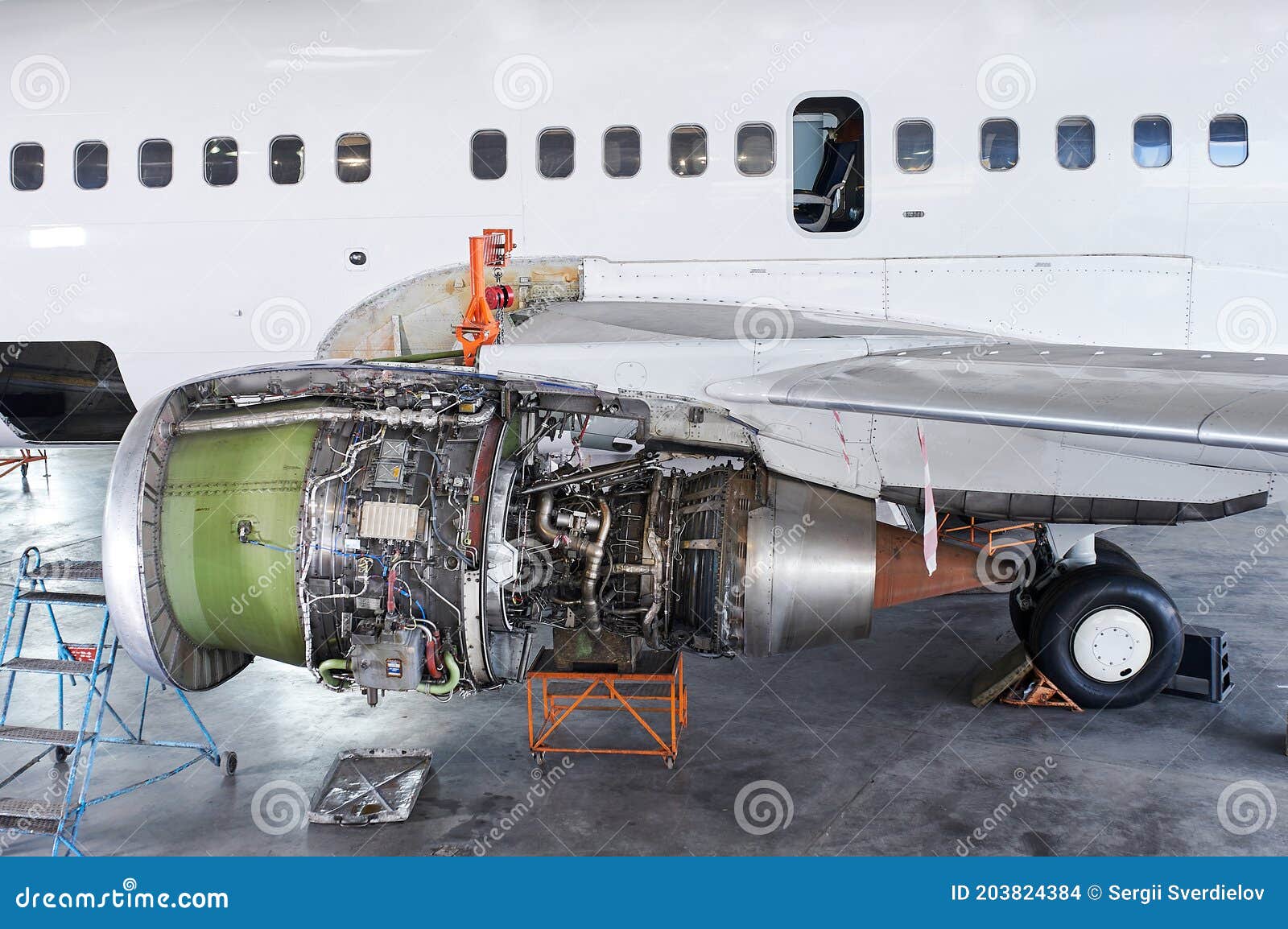 Aircraft Engine Servicing - Opened Panels of a Large Engine of Parked ...