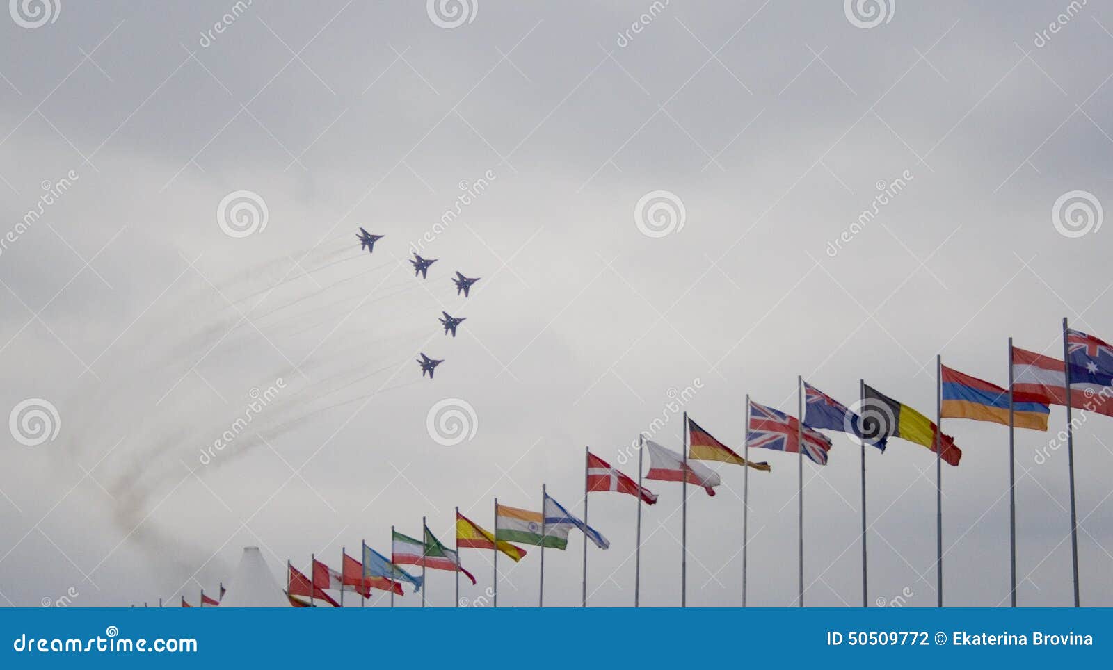 Aircraft and flags stock photo. Image of trail, horizontal - 50509772