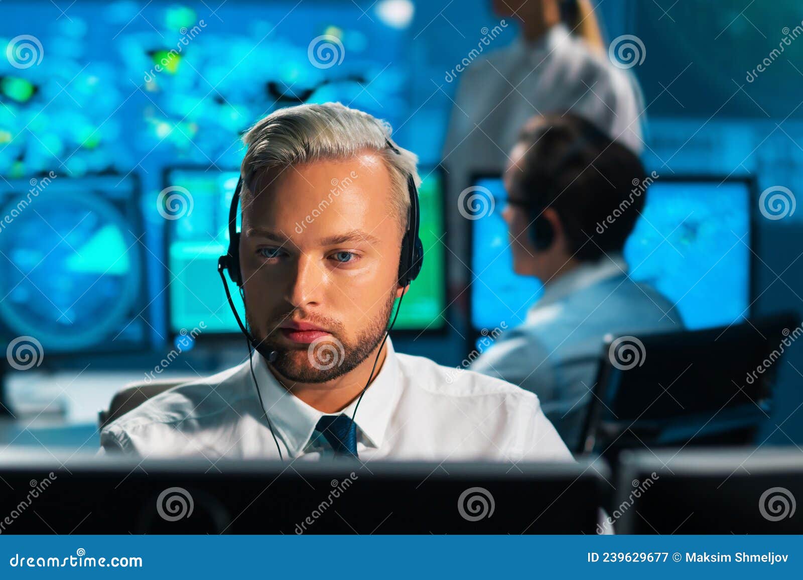 Aircraft Flight Control Officer Monitors the Approach of Aircraft from ...