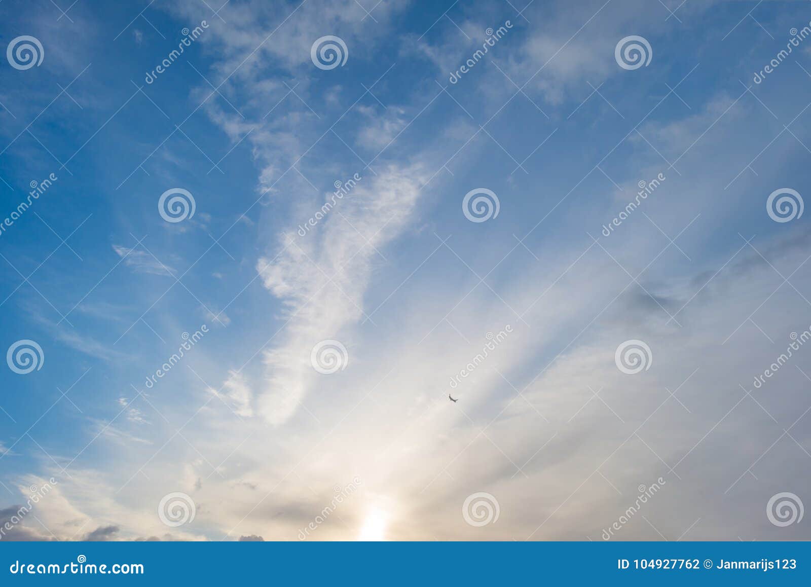 Aircraft Flying in a Blue Cloudy Sky at Fall Stock Photo - Image of ...