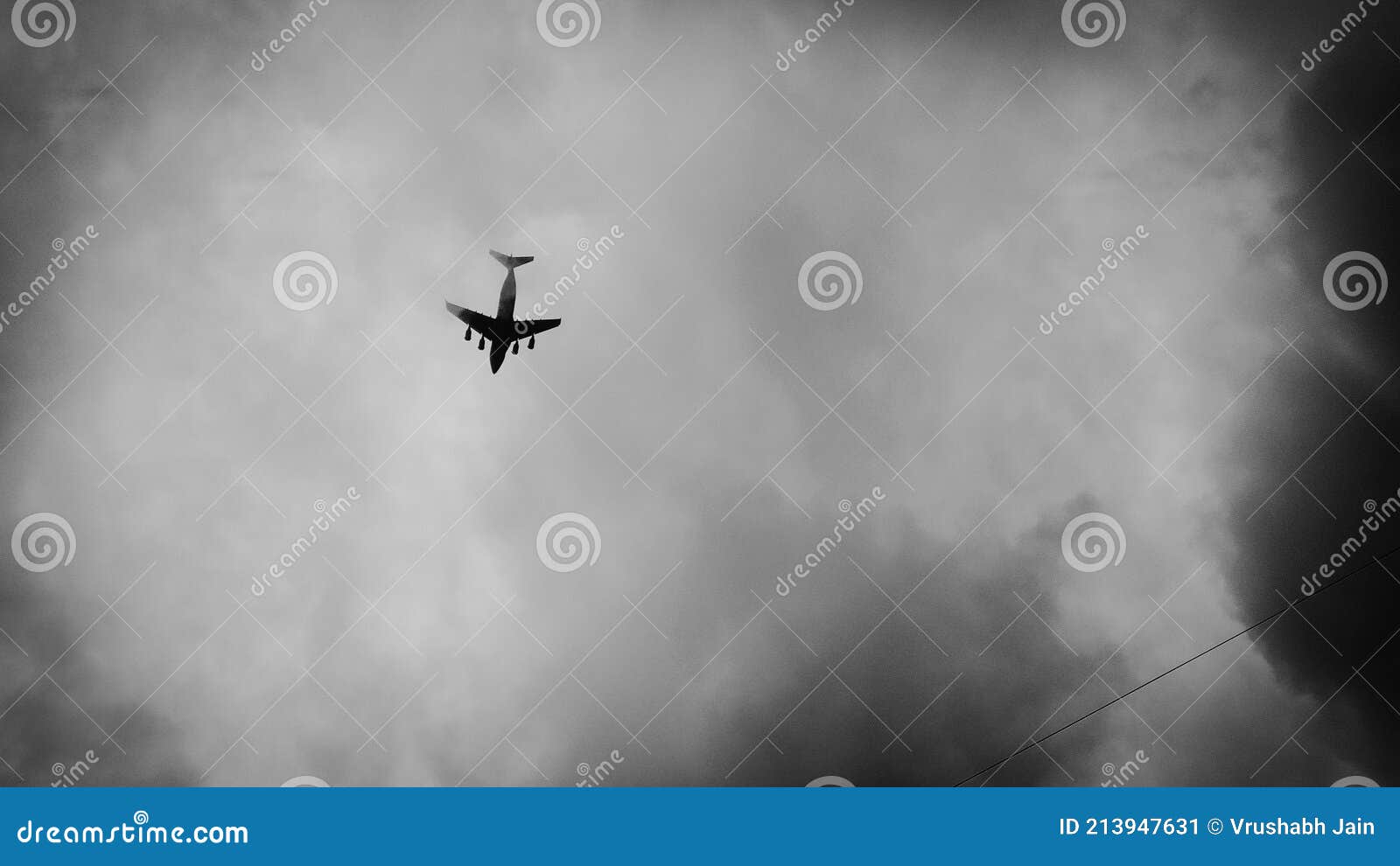 Aircraft Flying through Dark Clouds Stock Image - Image of white ...