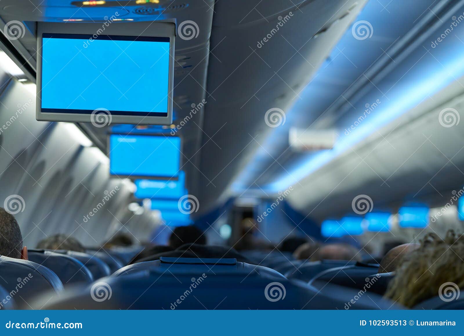 Aircraft Indoor Tv Screens in a Row Stock Image - Image of blue ...