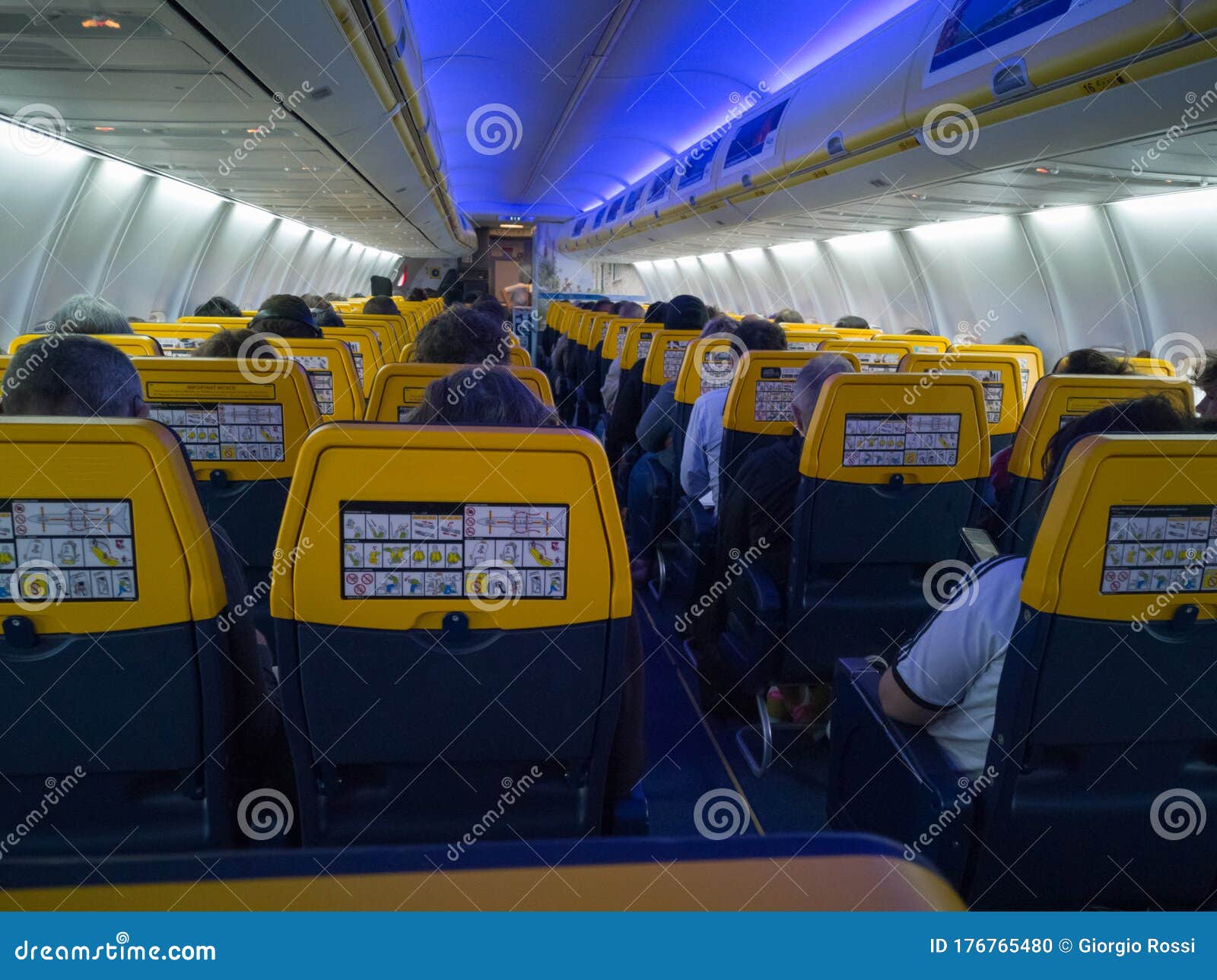 Aircraft Interiors and Cabin Full of Passengers during Flight Stock ...