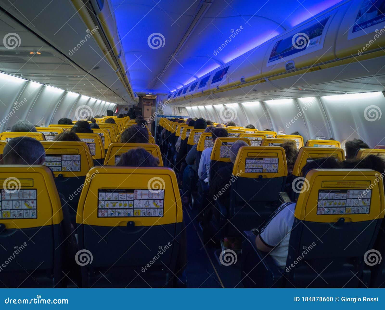 Aircraft Interiors and Cabin Full of Passengers during Flight Editorial ...