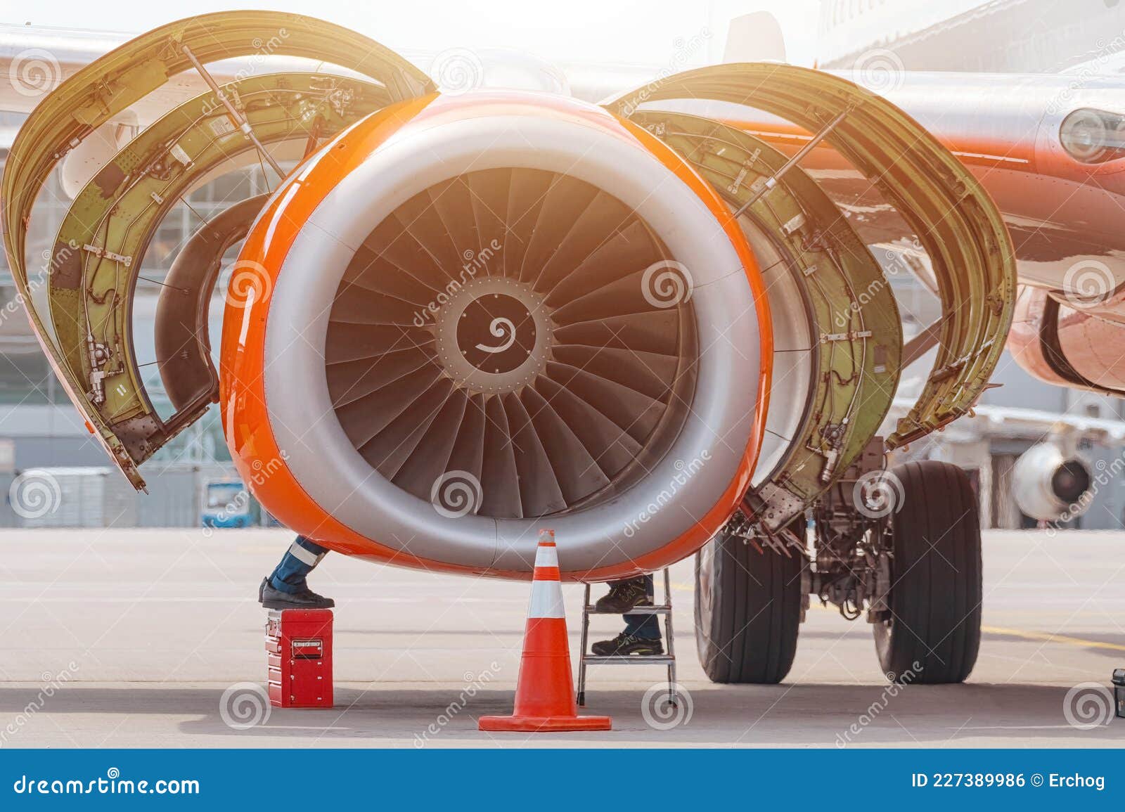 Aircraft Maintenance Mechanics Inspecting and Working on Airplane Jet ...