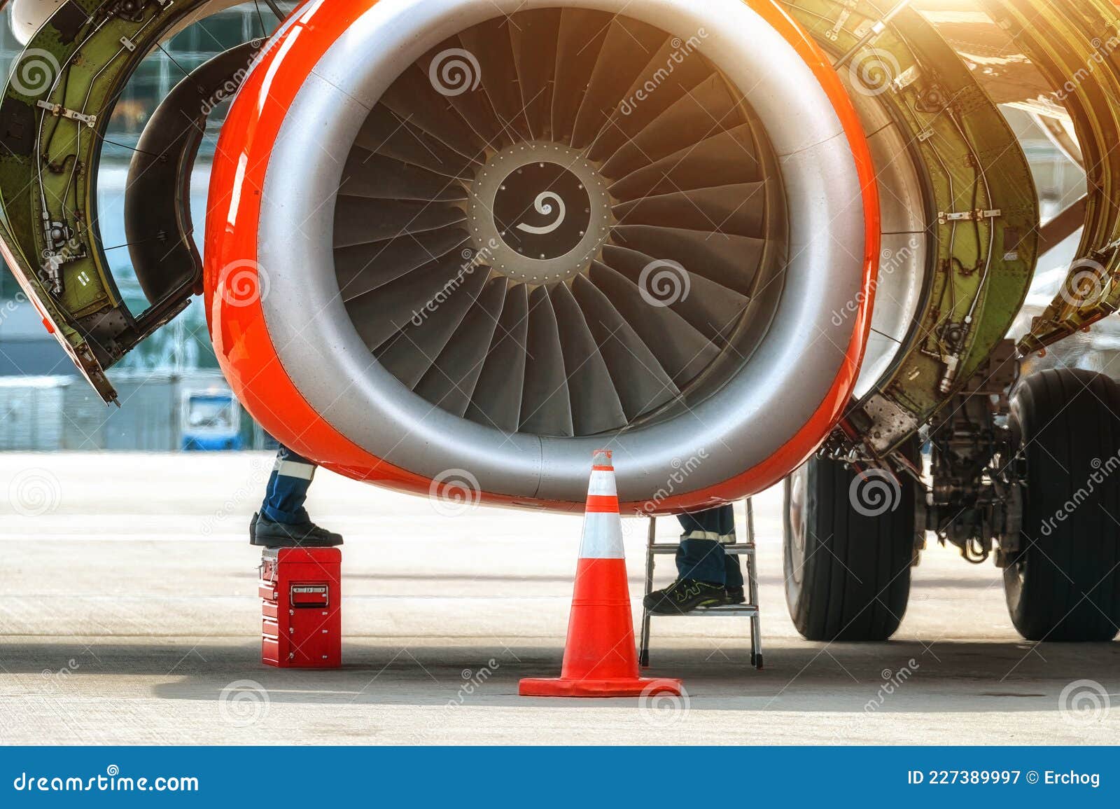 Aircraft Maintenance Mechanics Inspecting And Working On Airplane Jet ...