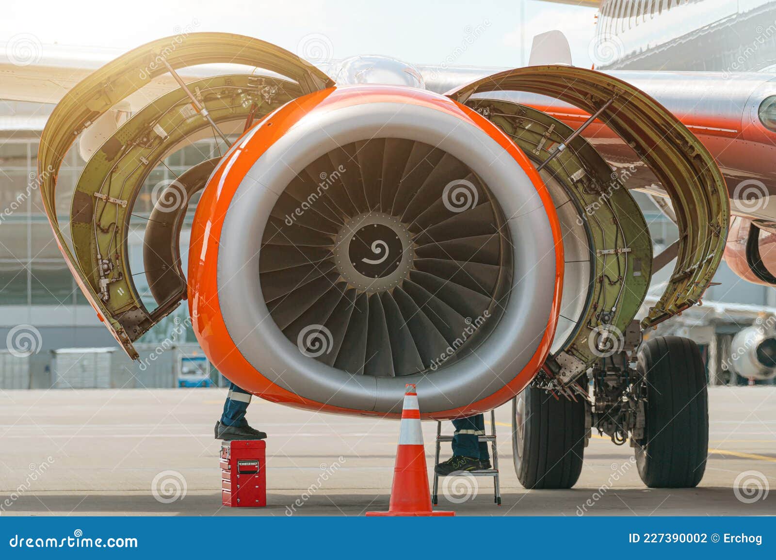 Aircraft Maintenance Mechanics Inspecting and Working on Airplane Jet ...