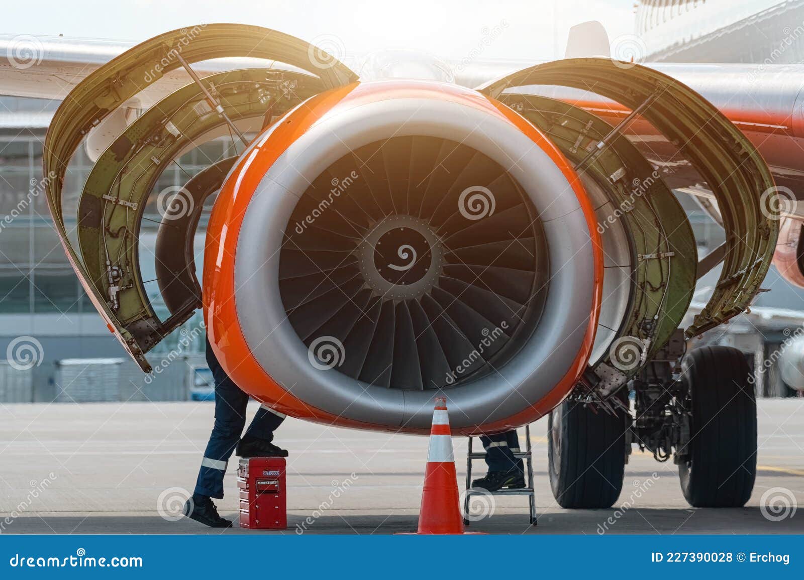 Aircraft Maintenance Mechanics Inspecting and Working on Airplane Jet ...