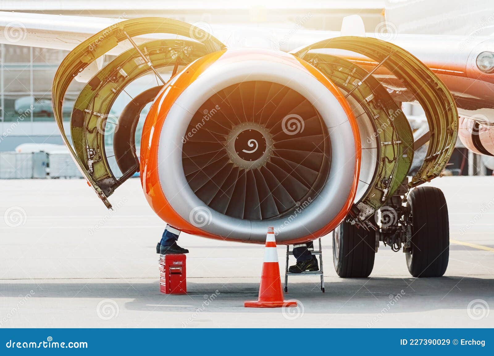 Aircraft Maintenance Mechanics Inspecting and Working on Airplane Jet ...