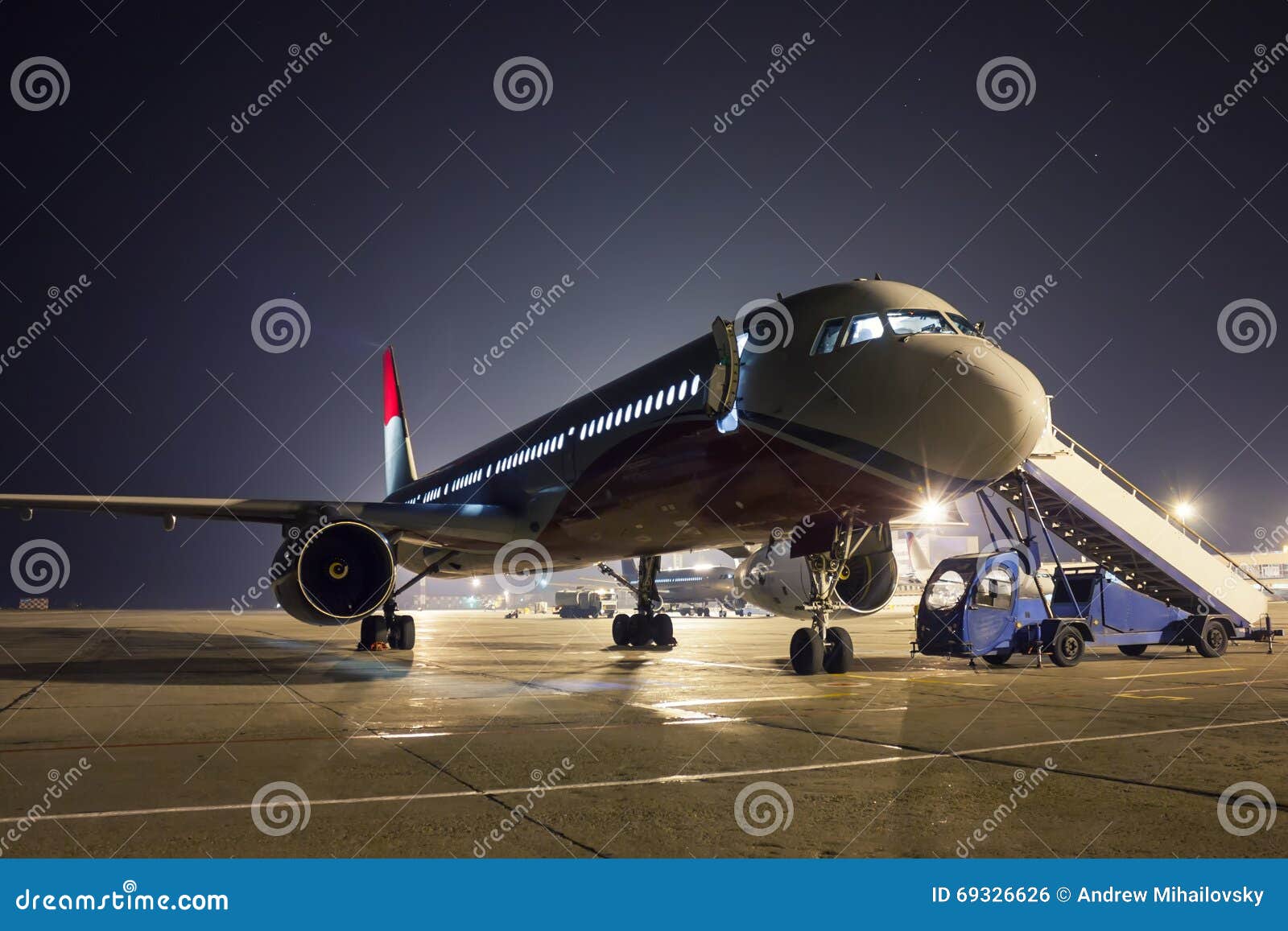 Aircraft Maintenance Mechanics Inspecting And Working On Airplane Jet ...