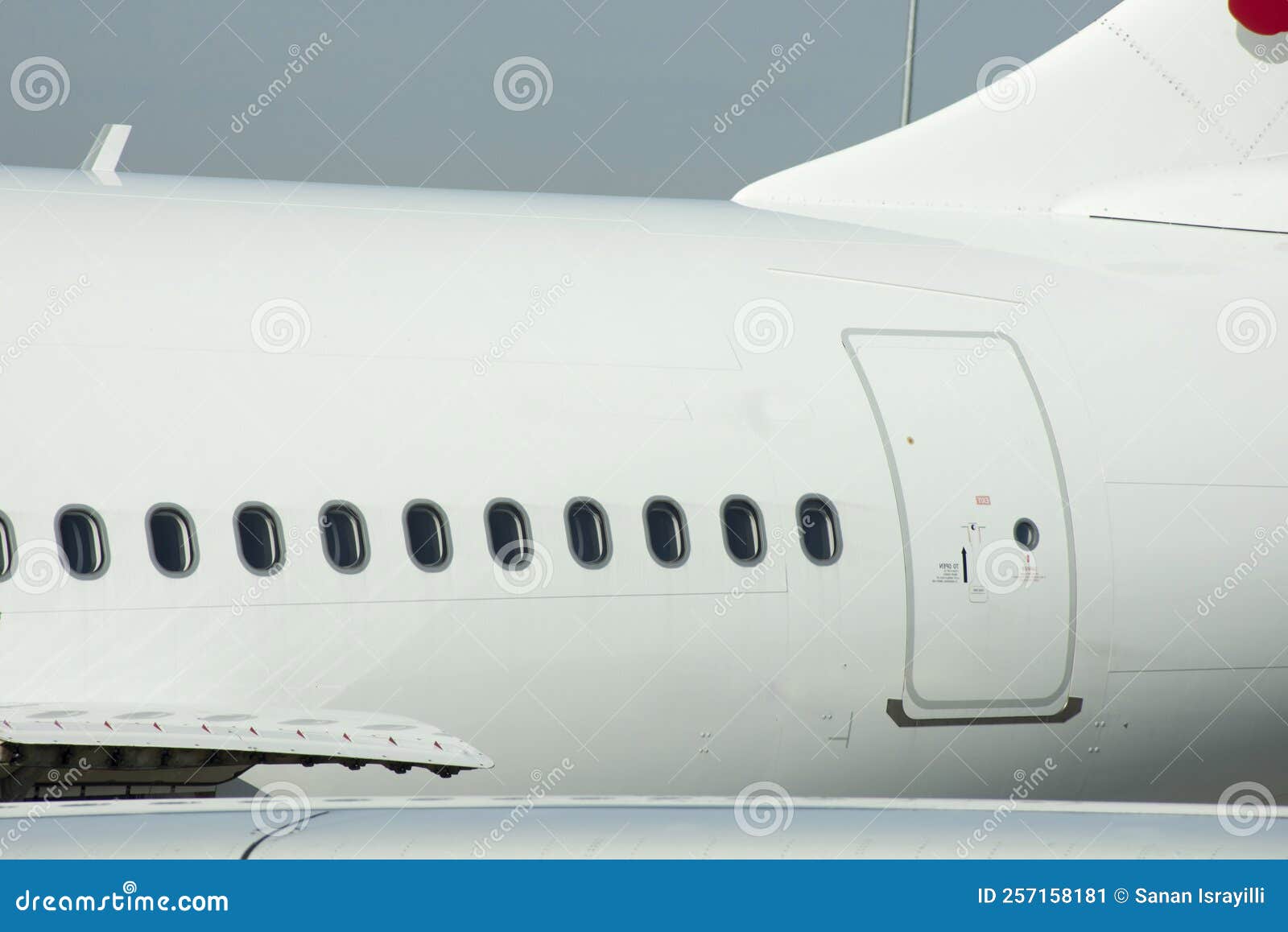 Aircraft Passenger Windows and Exit Door Stock Image - Image of windows ...