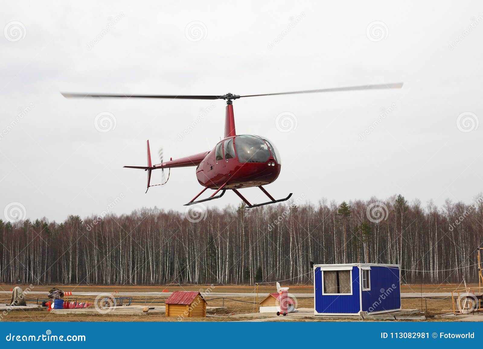 Aircraft - Red Small Helicopter Makes Flight at Low Height Stock Image ...