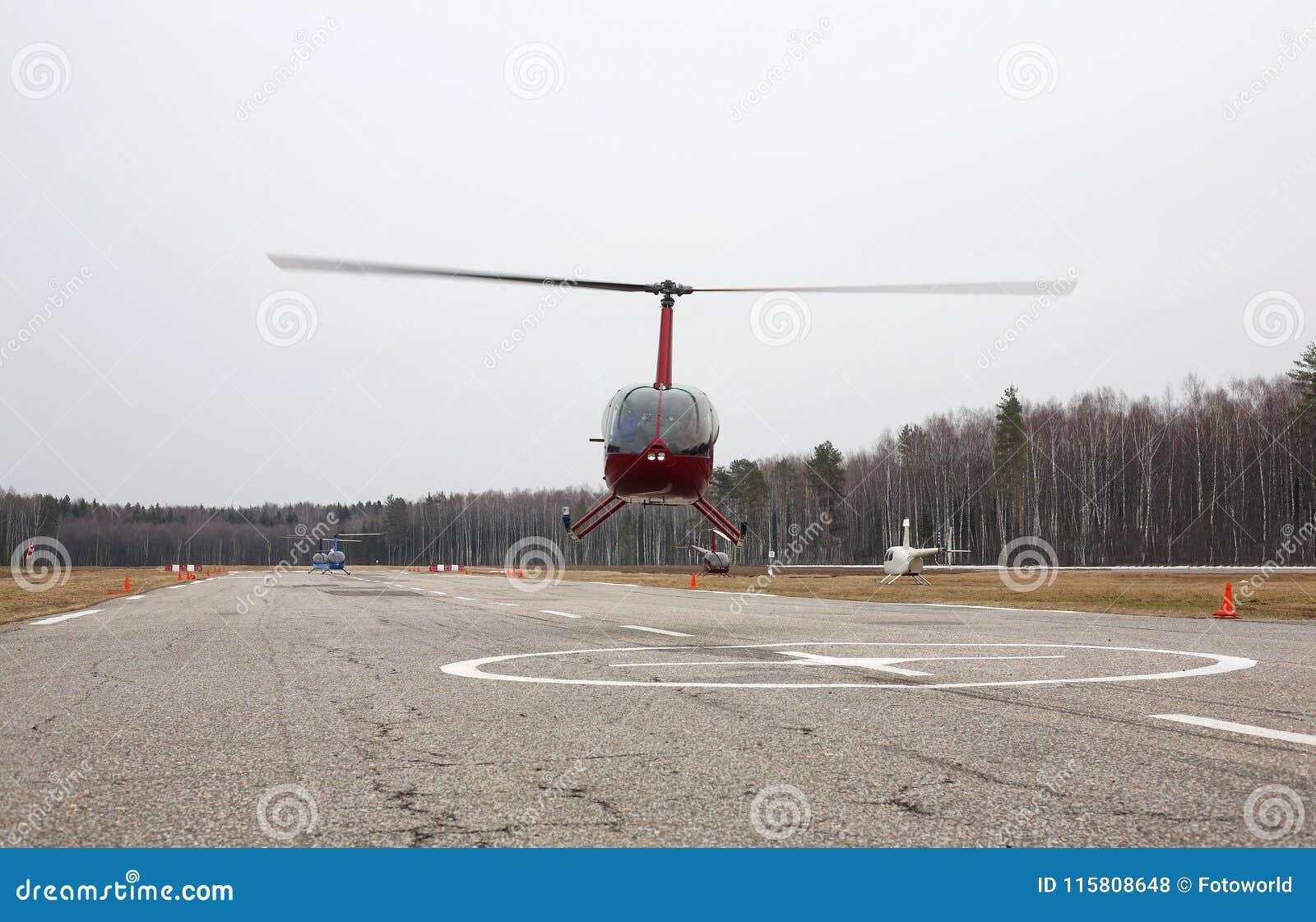 Aircraft - Red Small Helicopter Makes Flight at Low Height Stock Photo ...