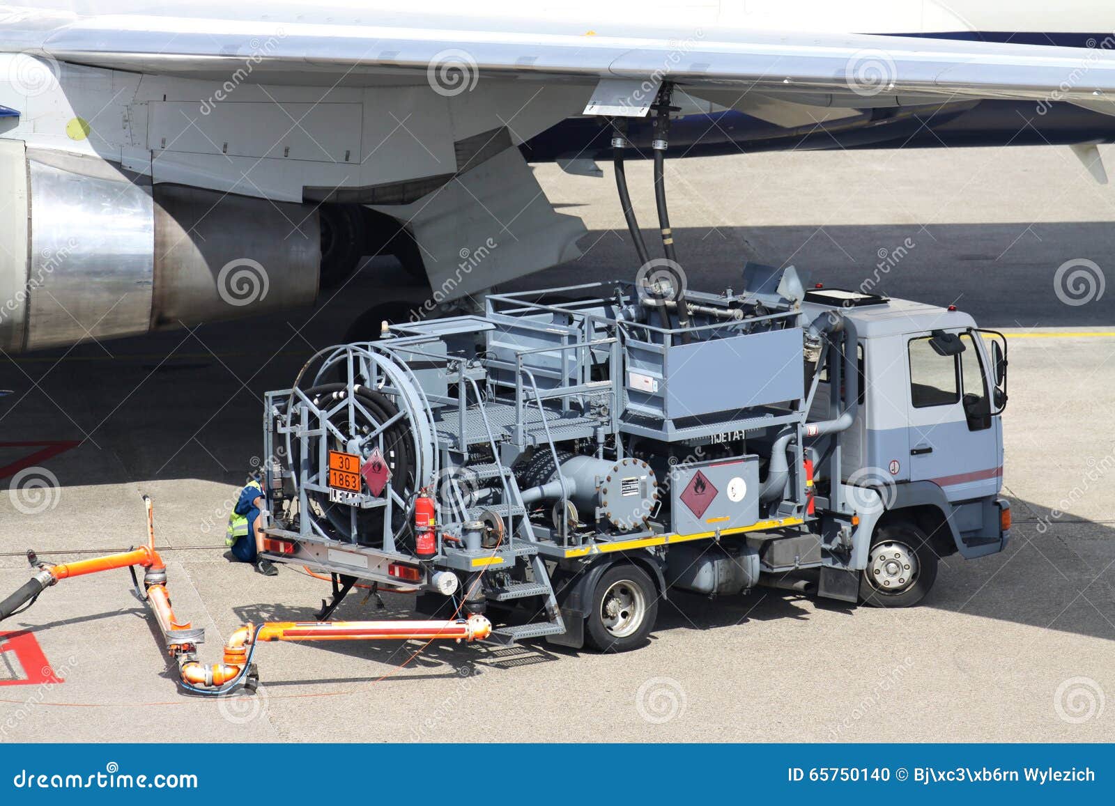Aircraft refueller stock photo. Image of fuel, flying - 65750140