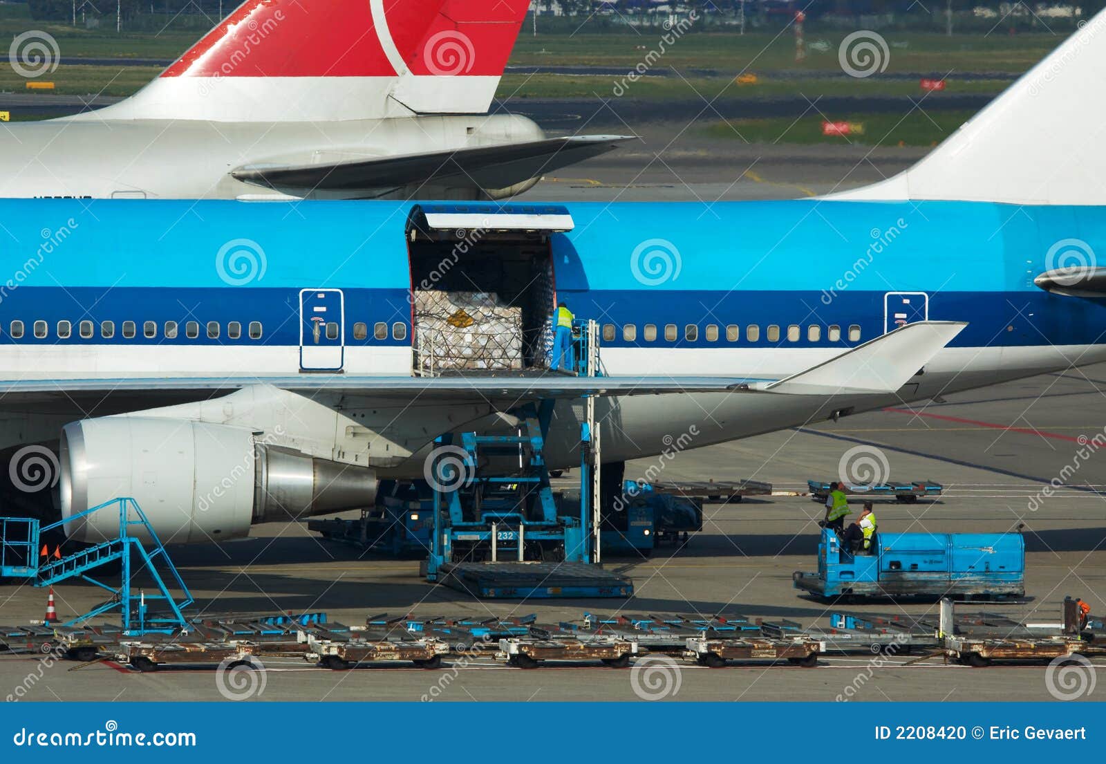 Aircraft unloading cargo stock photo. Image of business - 2208420