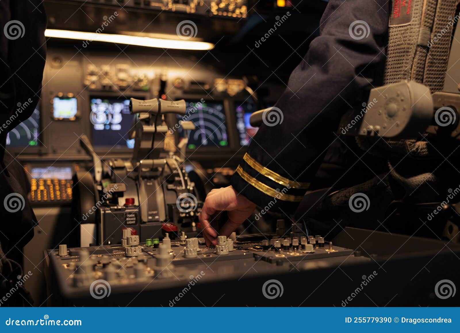 Aircrew Member Using Control Panel Command on Dashboard Stock Photo ...