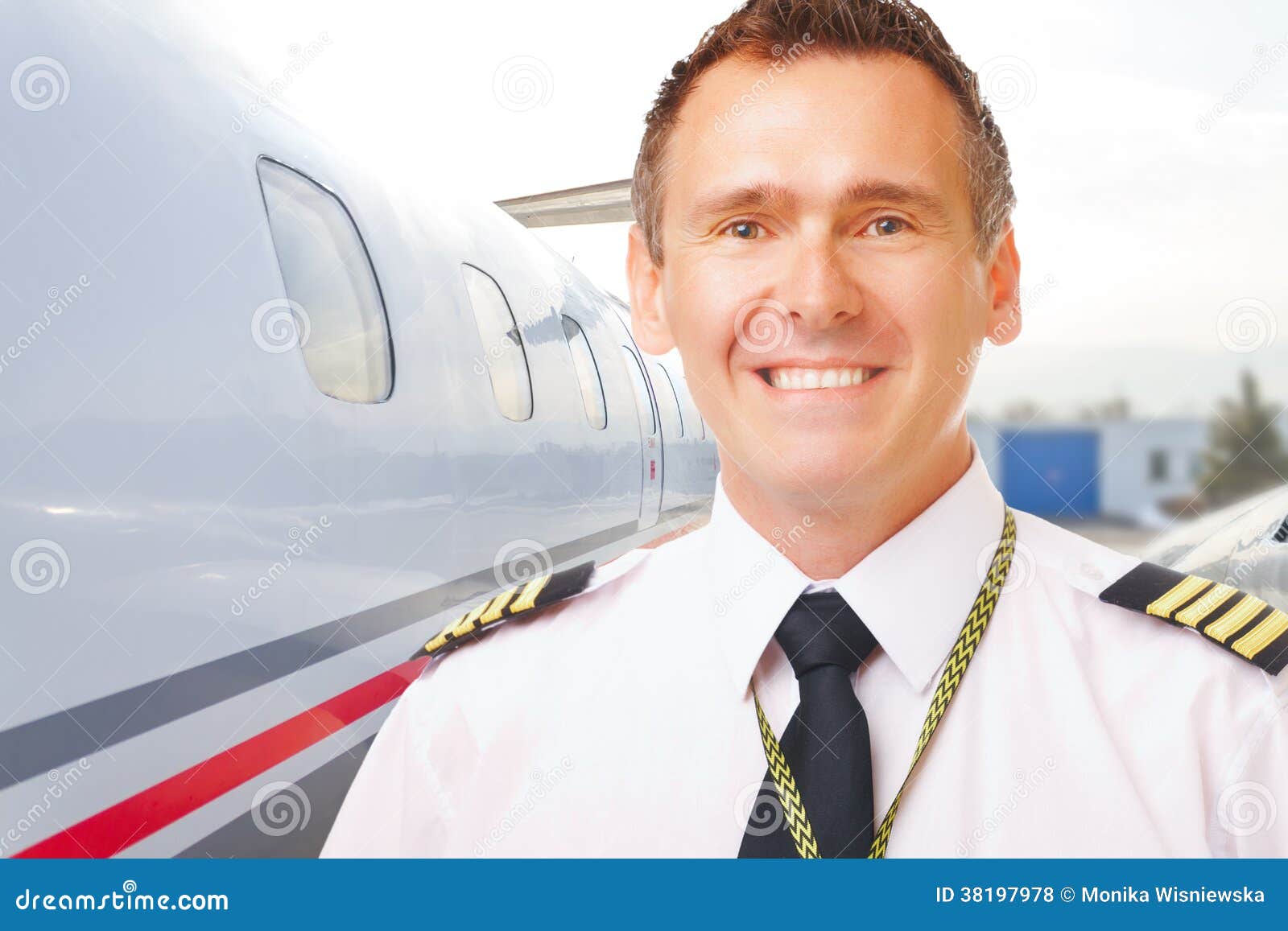 Airline Pilot at the Airport Stock Photo - Image of commercial, airport ...