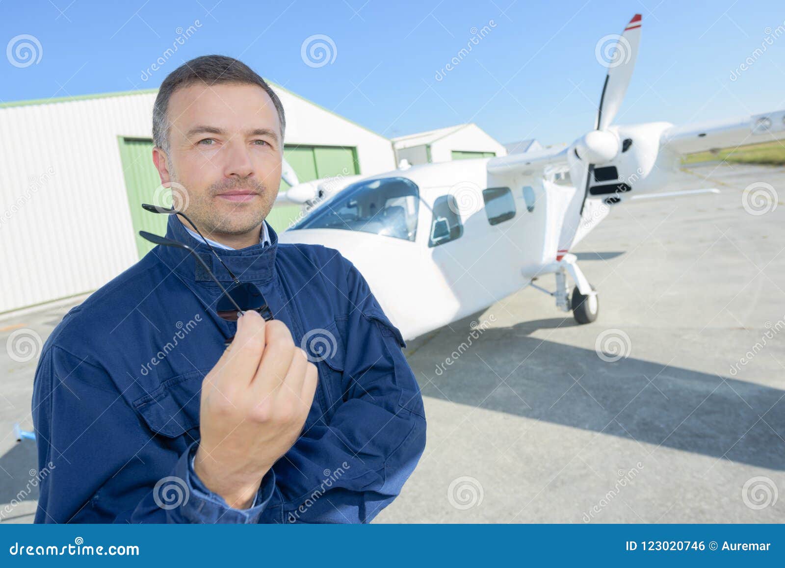 Airline Pilot Standing Near Aircraft Stock Photo - Image of icon ...