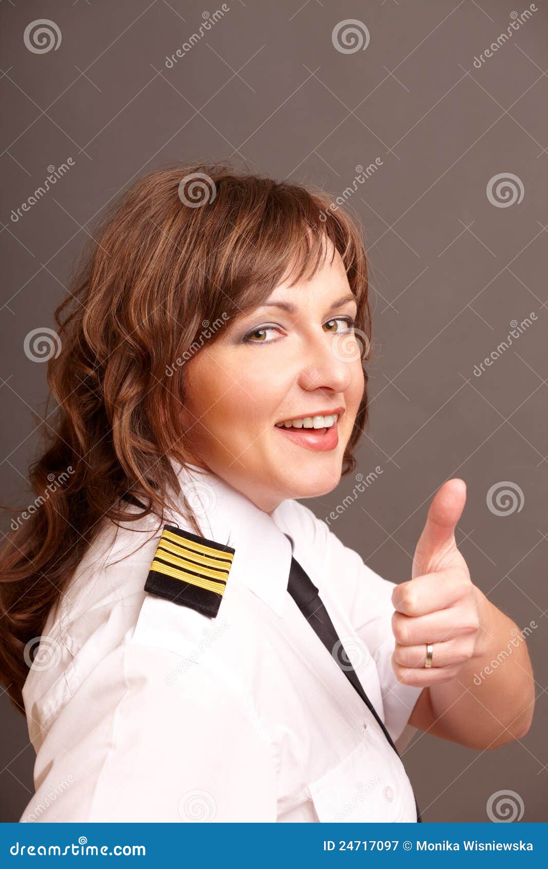 Airline pilot thumb up stock image. Image of smile, airlines - 24717097