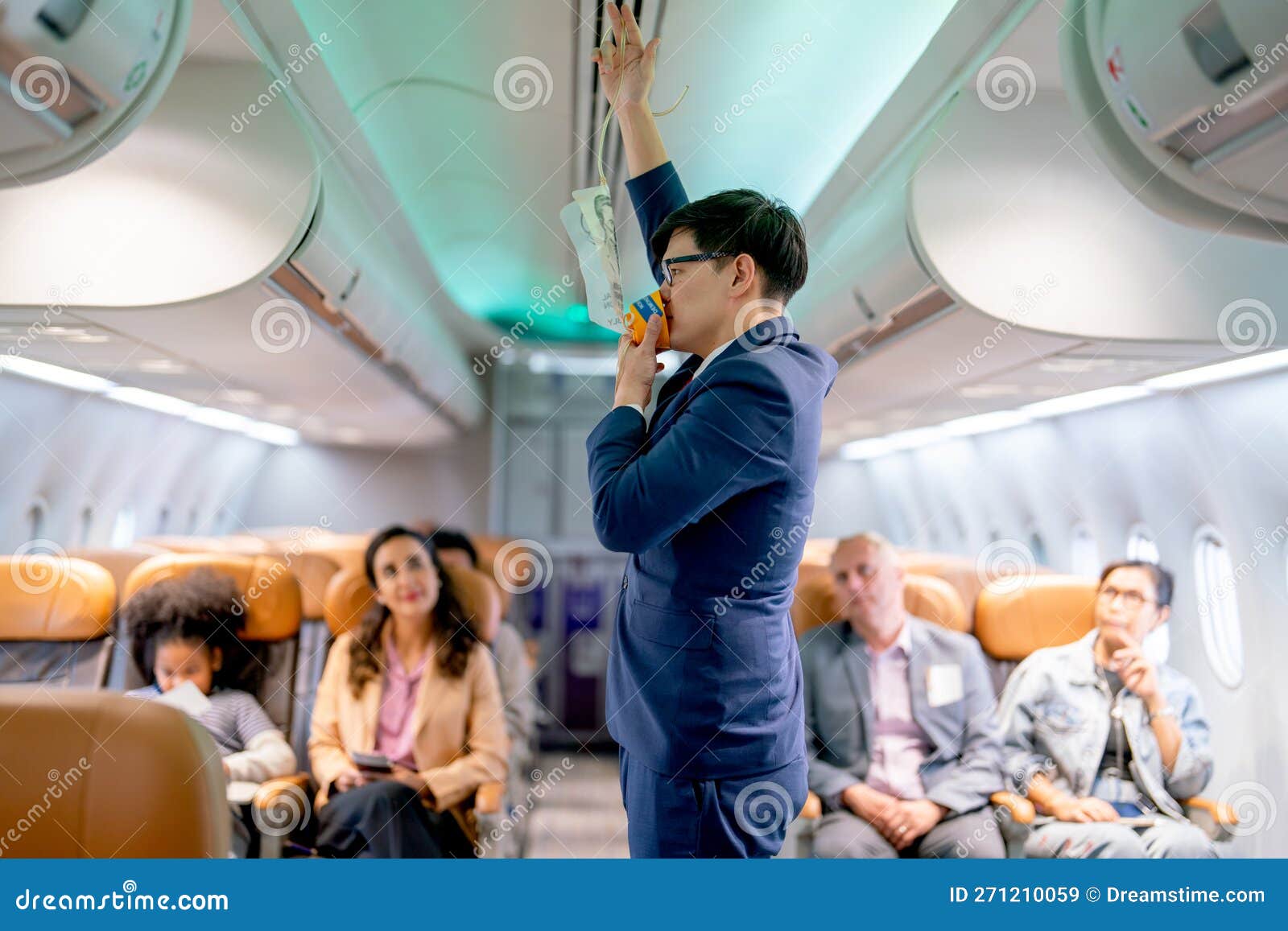 Airline Staff Man Demonstration and Explain about Safety Tools, Oxygen ... Airline Staff Man Demonstration and Explain about Safety Tools, Oxygen ...