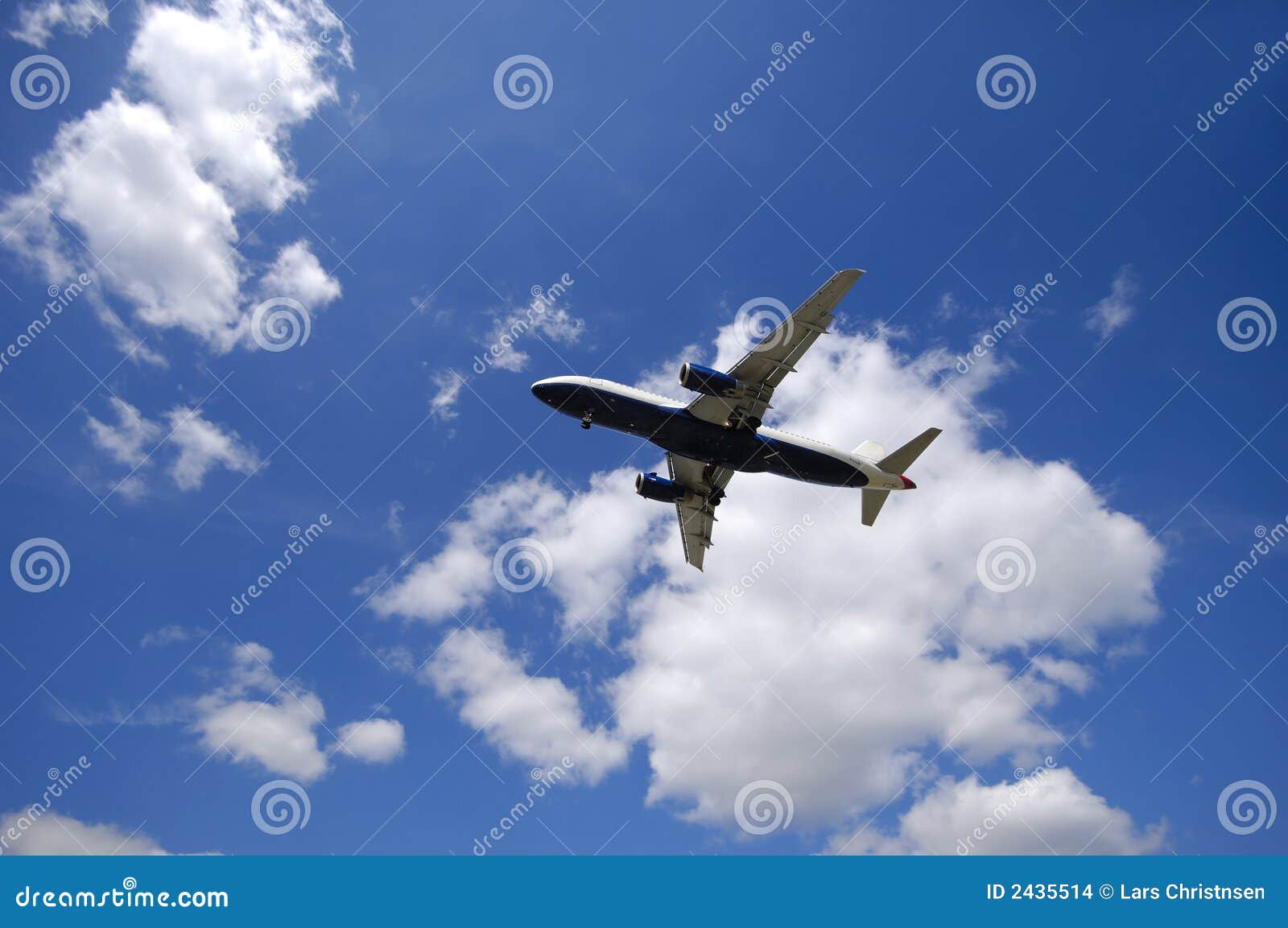 Airliner and clouds stock photo. Image of color, colorful - 2435514