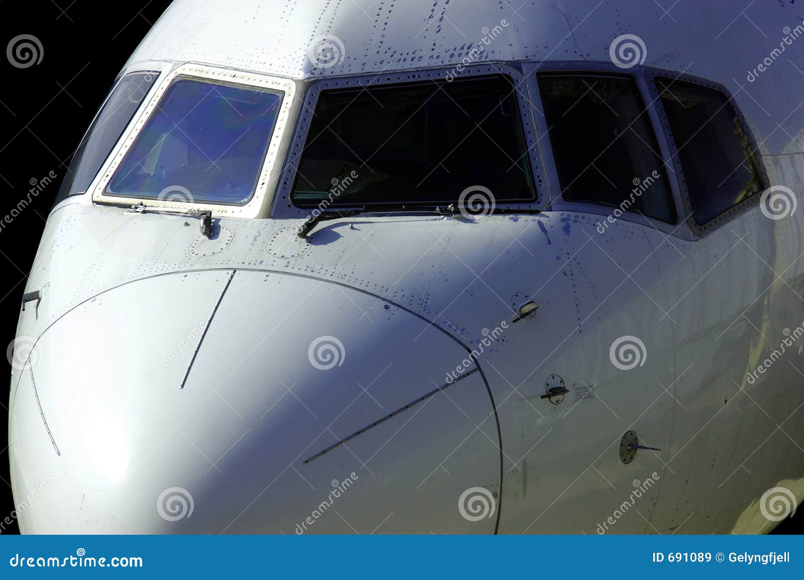 Airplane stock image. Image of nose, fading, airliner, wipers - 691089