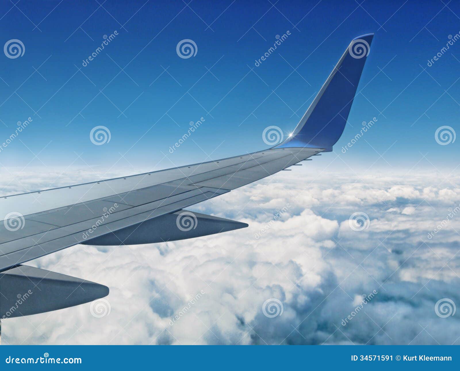 Airplane above Clouds stock image. Image of ticket, airplane - 34571591