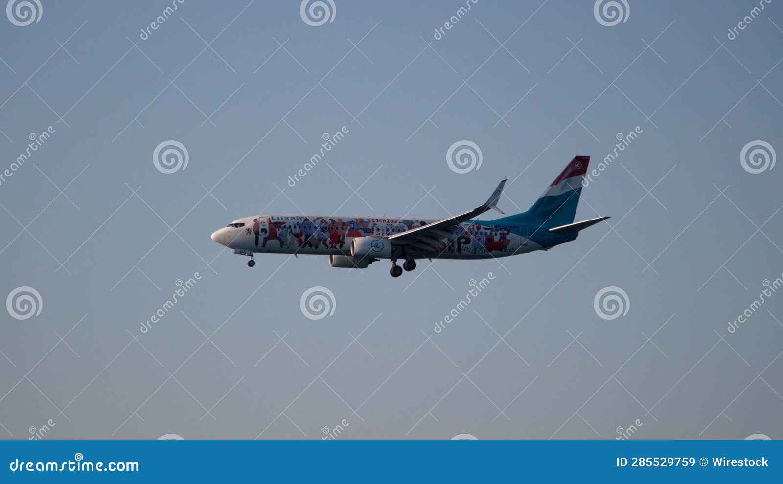 An Airplane in the Air with Graffiti on it S Tail Editorial Stock Image ...