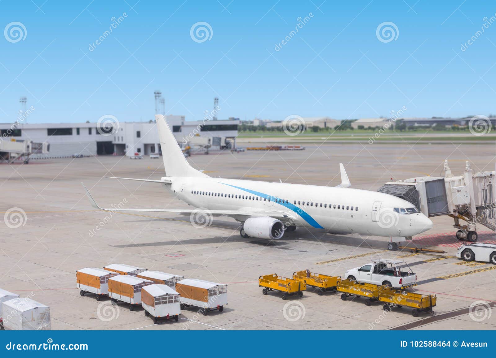 Airplane at airport gate stock photo. Image of aviation - 102588464