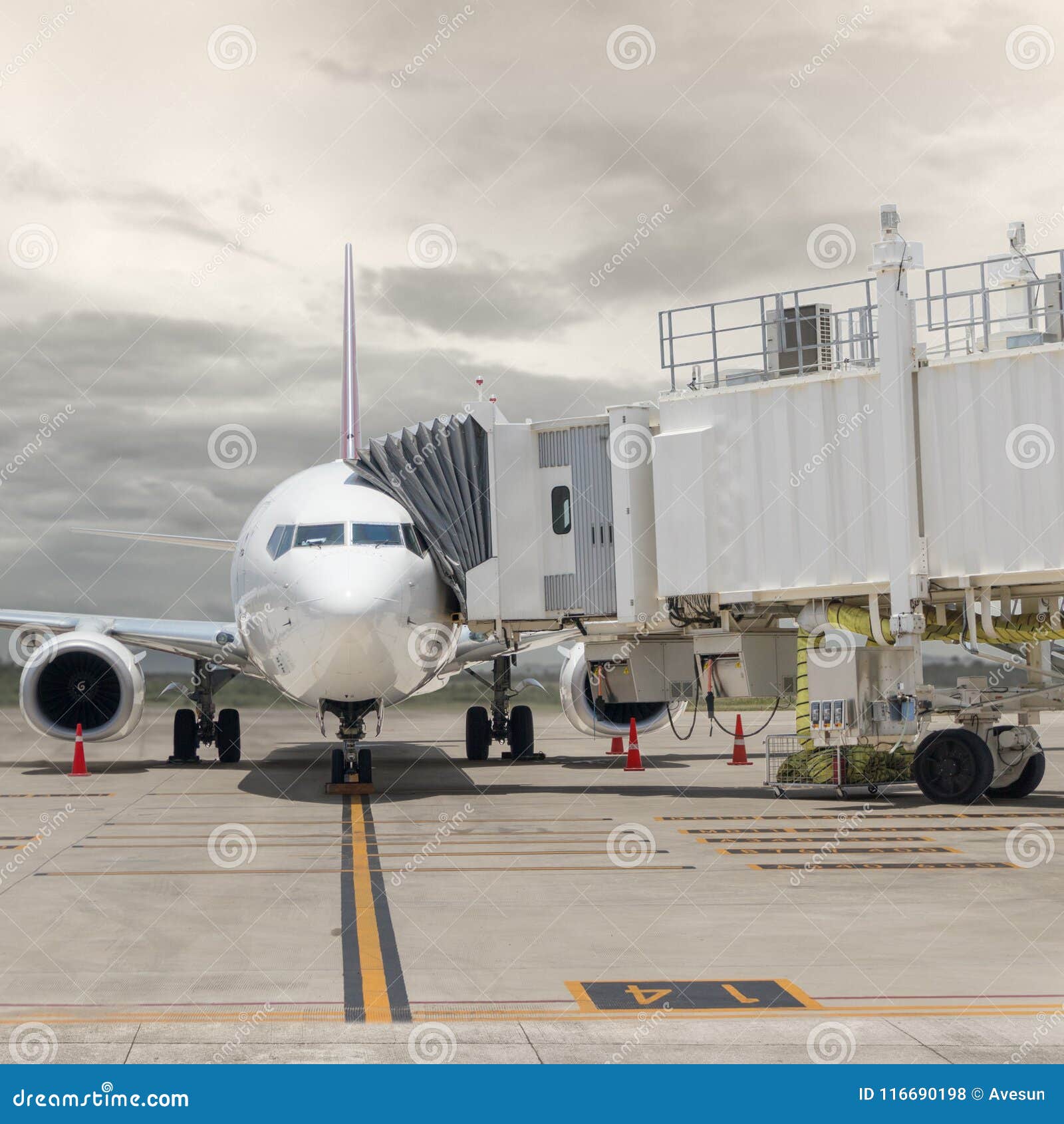 Airplane at airport gate stock photo. Image of departure - 116690198