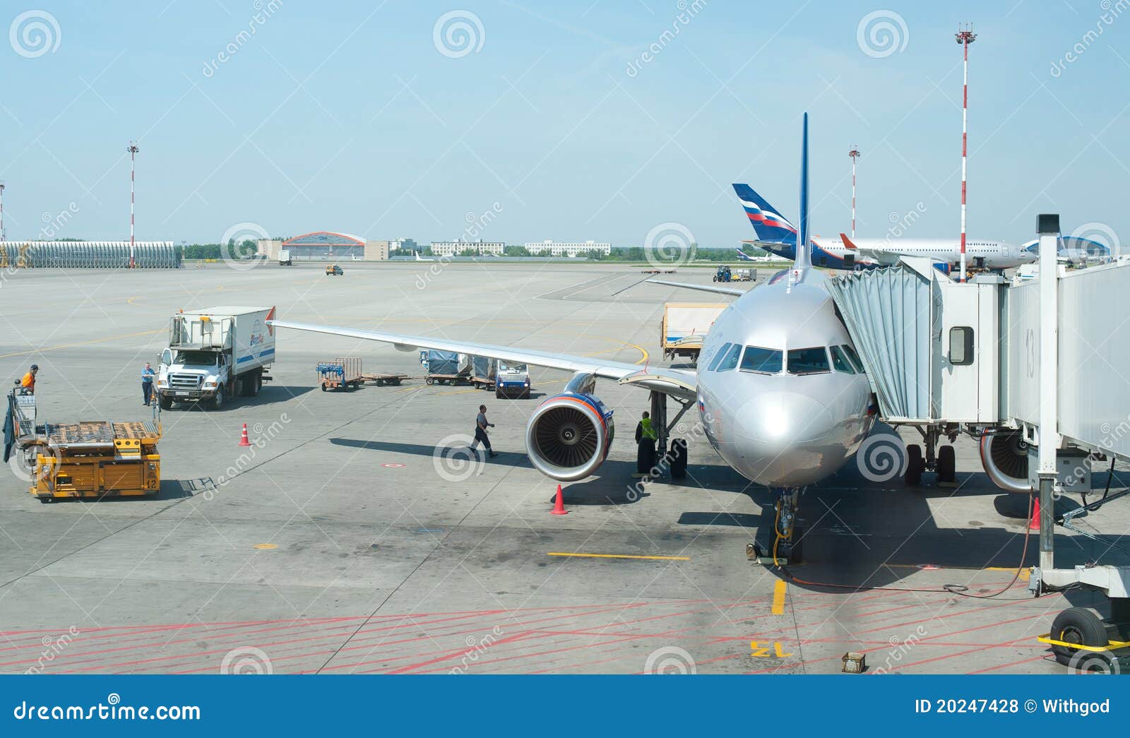 Airplane at Airport Terminal Editorial Stock Photo - Image of personnel ...