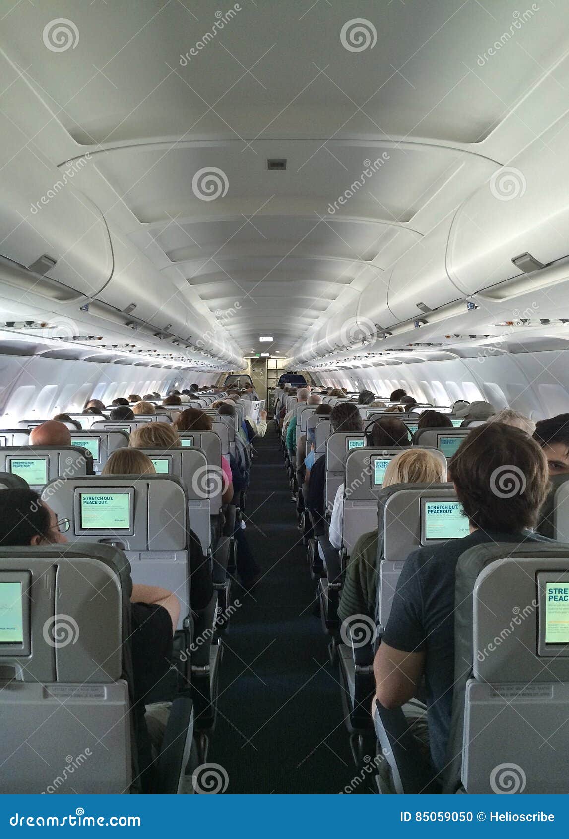 Airplane Aisle editorial image. Image of tourism, overhead - 85059050