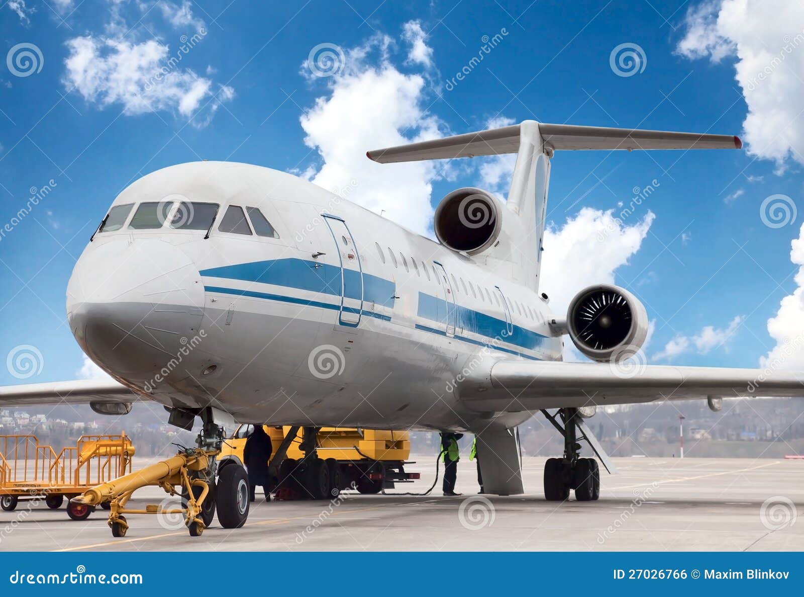 Airplane is being serviced stock photo. Image of loading - 27026766
